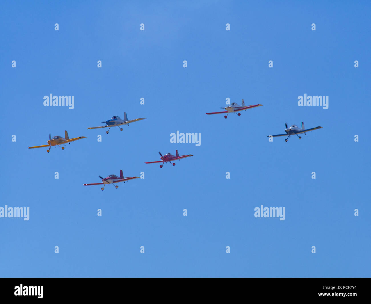Squadron of planes flying in formation Stock Photo - Alamy