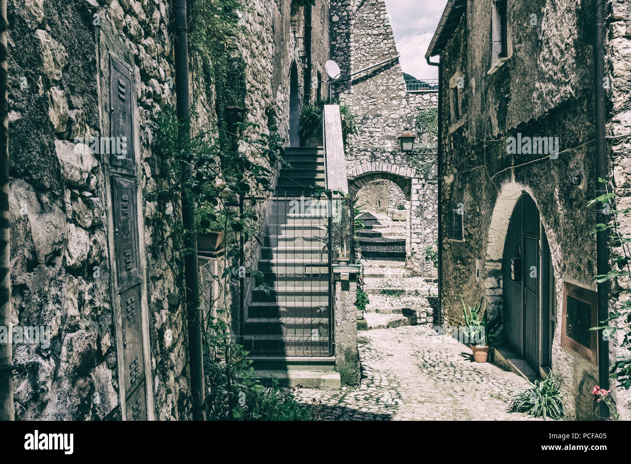 Metallic modern gate of a house on a medieval town Stock Photo - Alamy