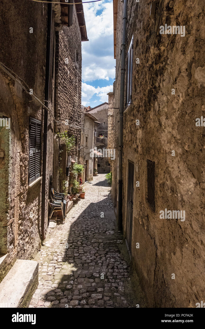 Ancient worn walls of a medieval town alley Stock Photo - Alamy