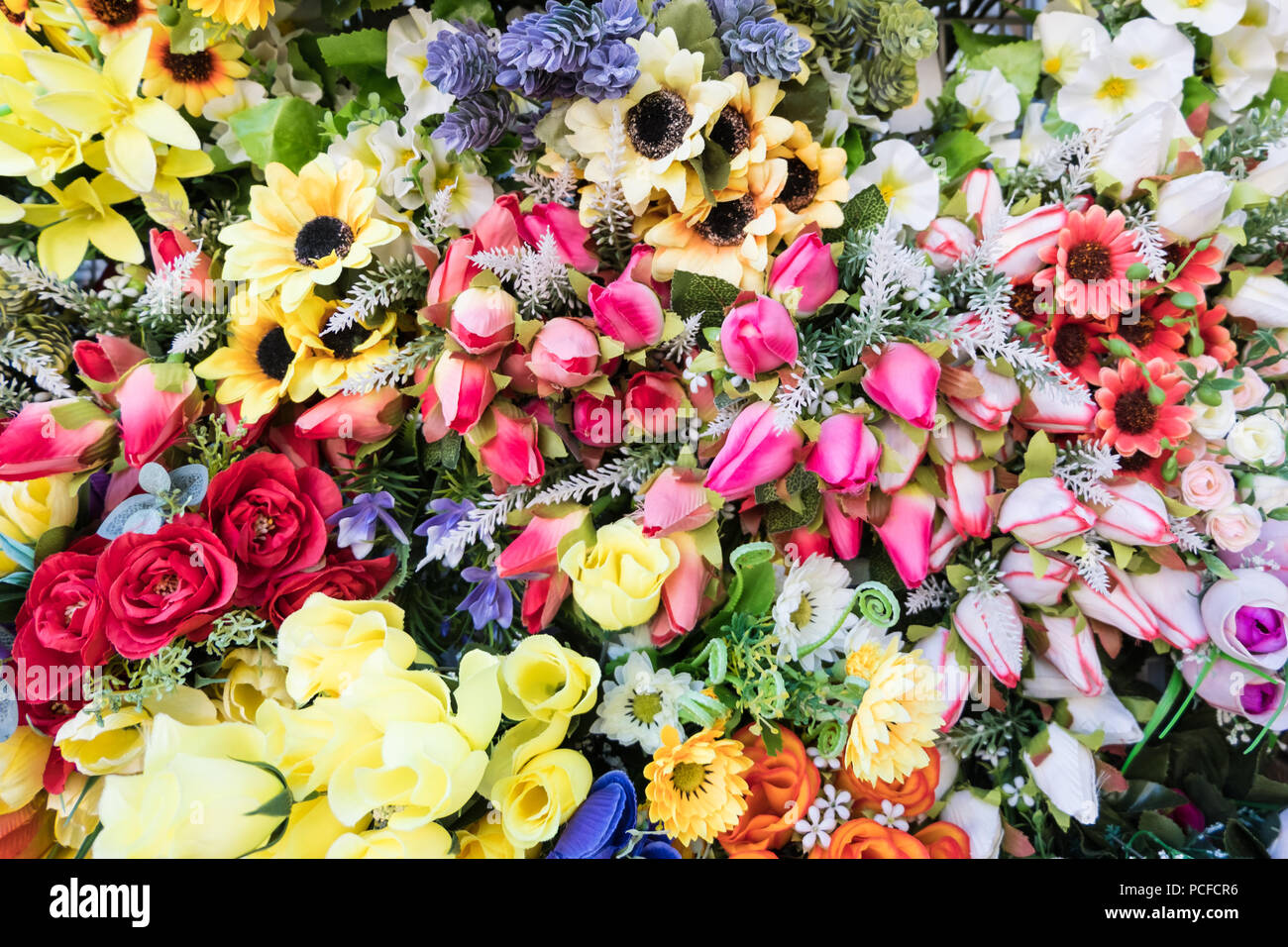 Multicolored plastic flower hi-res stock photography and images - Alamy