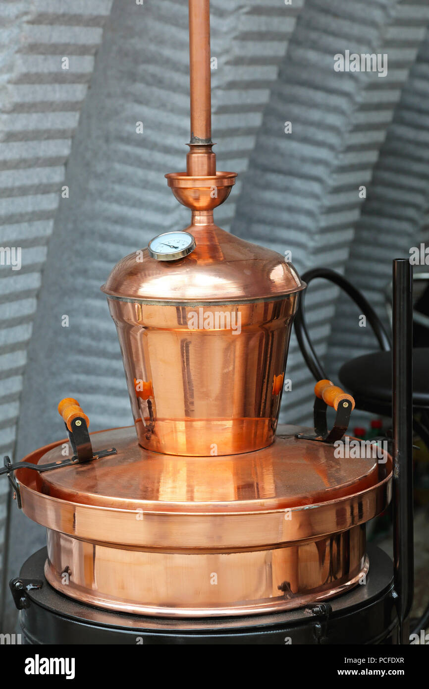 Copper still apparatus for distilling alcohol Stock Photo - Alamy