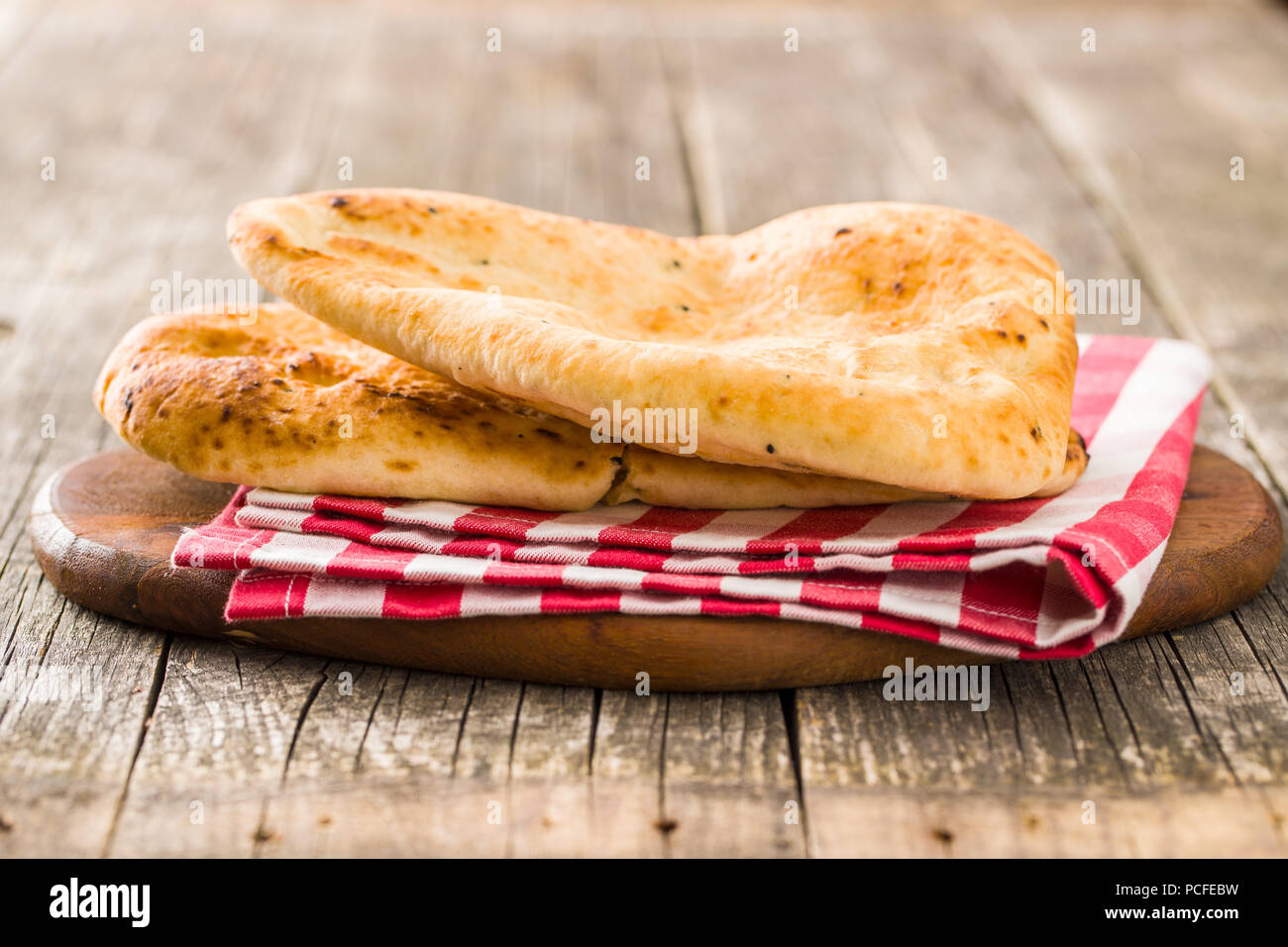 Indian nan flat bread hi-res stock photography and images - Alamy