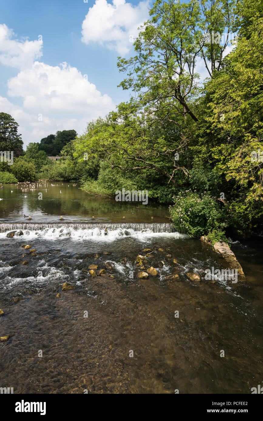 The River Wye flowing through Bakewell in the Peak District national ...