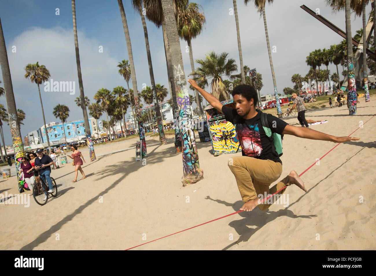 Balancing on a slackline, Venice Beach, Los Angeles, California, United ...
