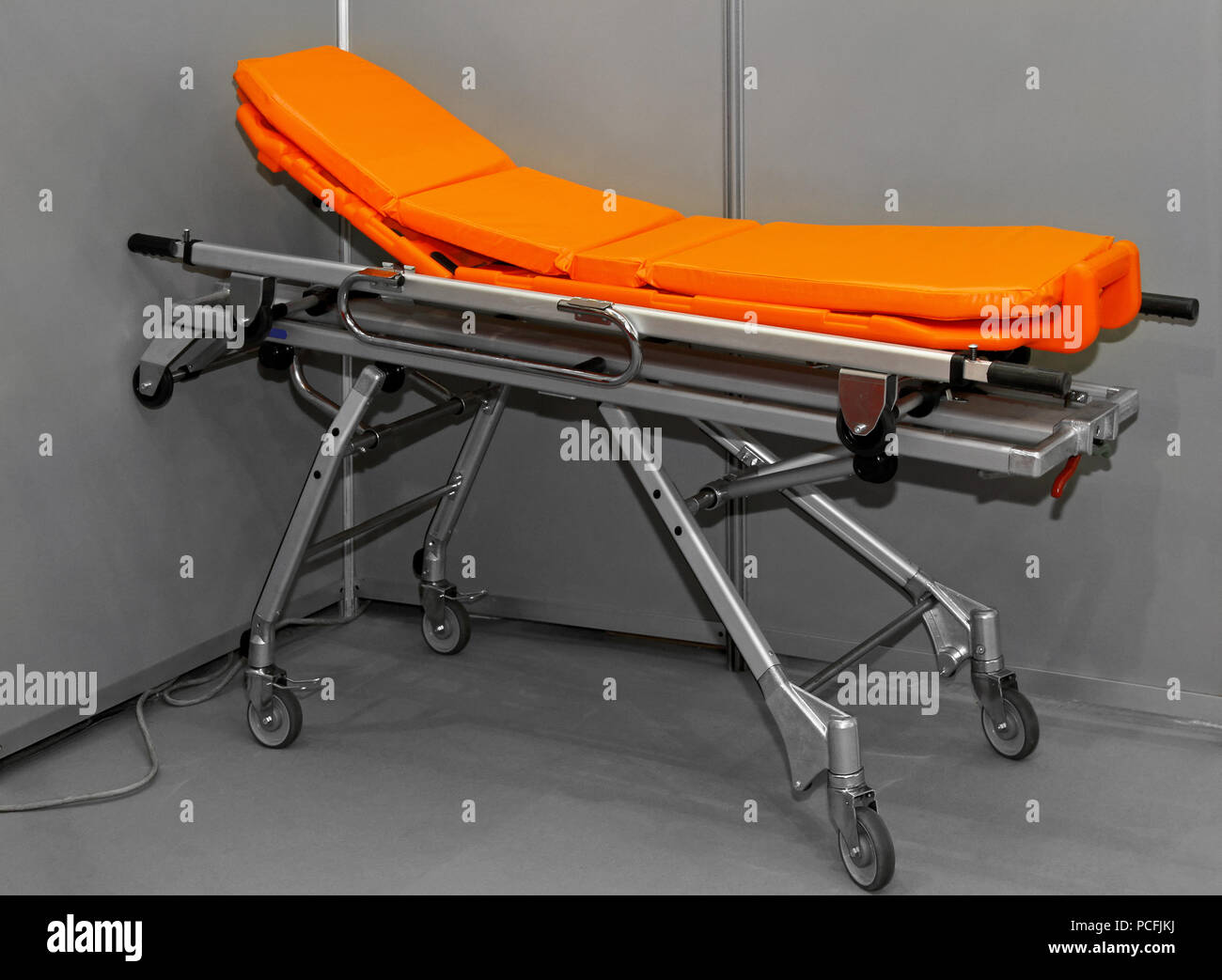Modern orange multi functional aluminum ambulance stretcher Stock Photo ... Modern orange multi functional aluminum ambulance stretcher Stock Photo ...