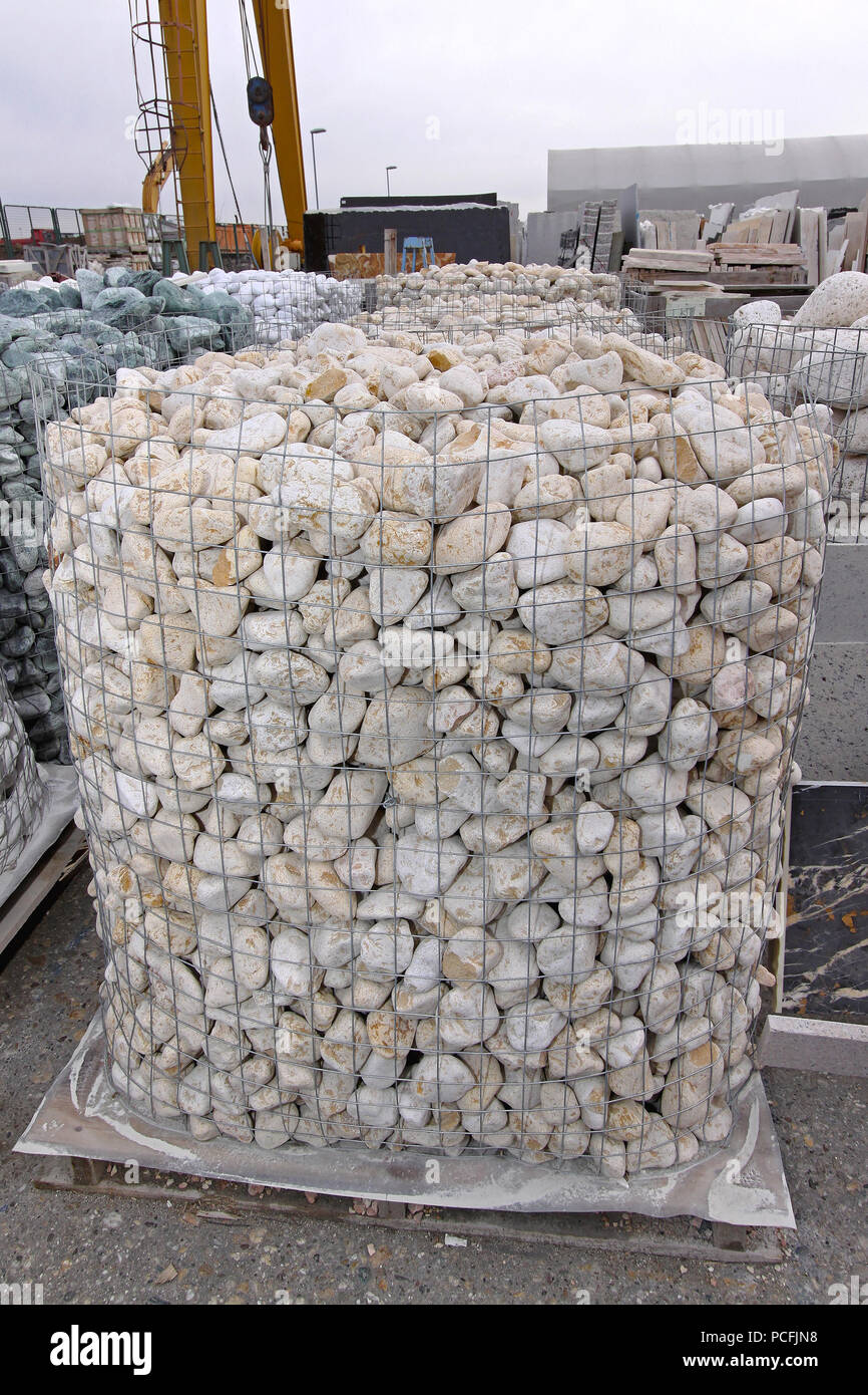 Industrial warehouse with stones and pebbles in bulk packages Stock ...