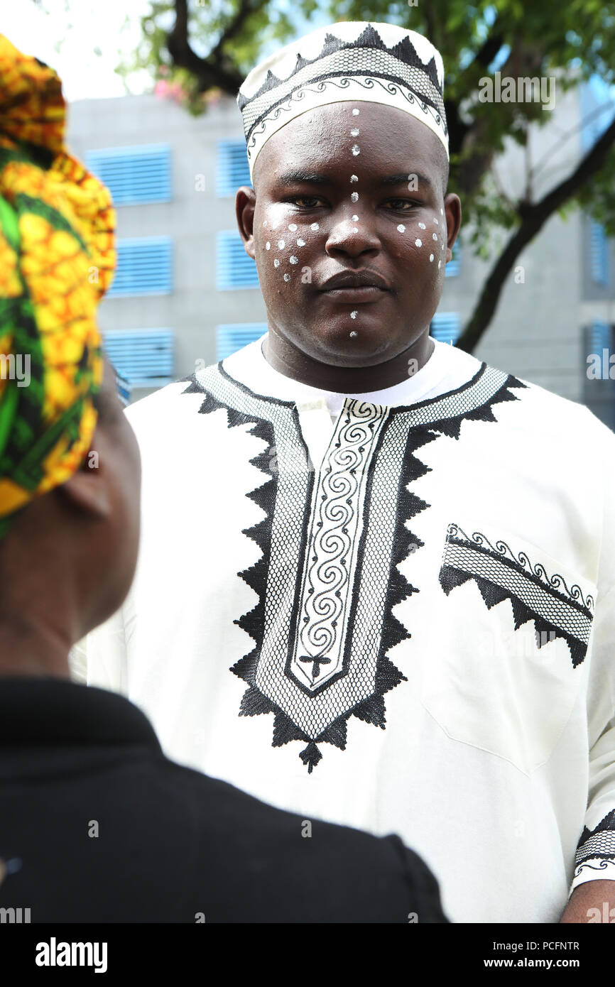 Port of Spain, Trinidad, Tobago. 1st Aug 2018. People wear traditional ...