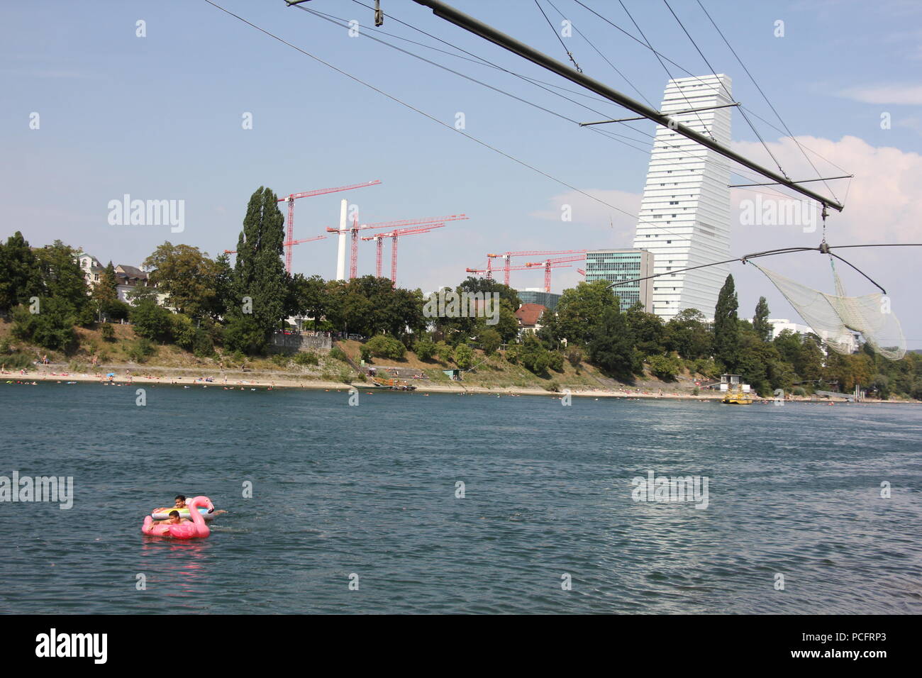 Basel, Switzerland. 1st Aug 2018. People swimming in the Rhine river in ...