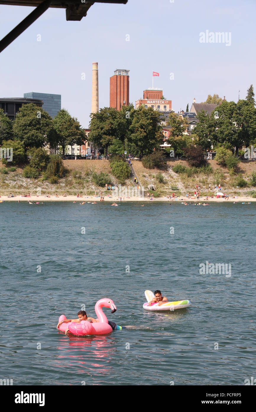 Basel, Switzerland. 1st Aug 2018. People swimming in the Rhine river in ...