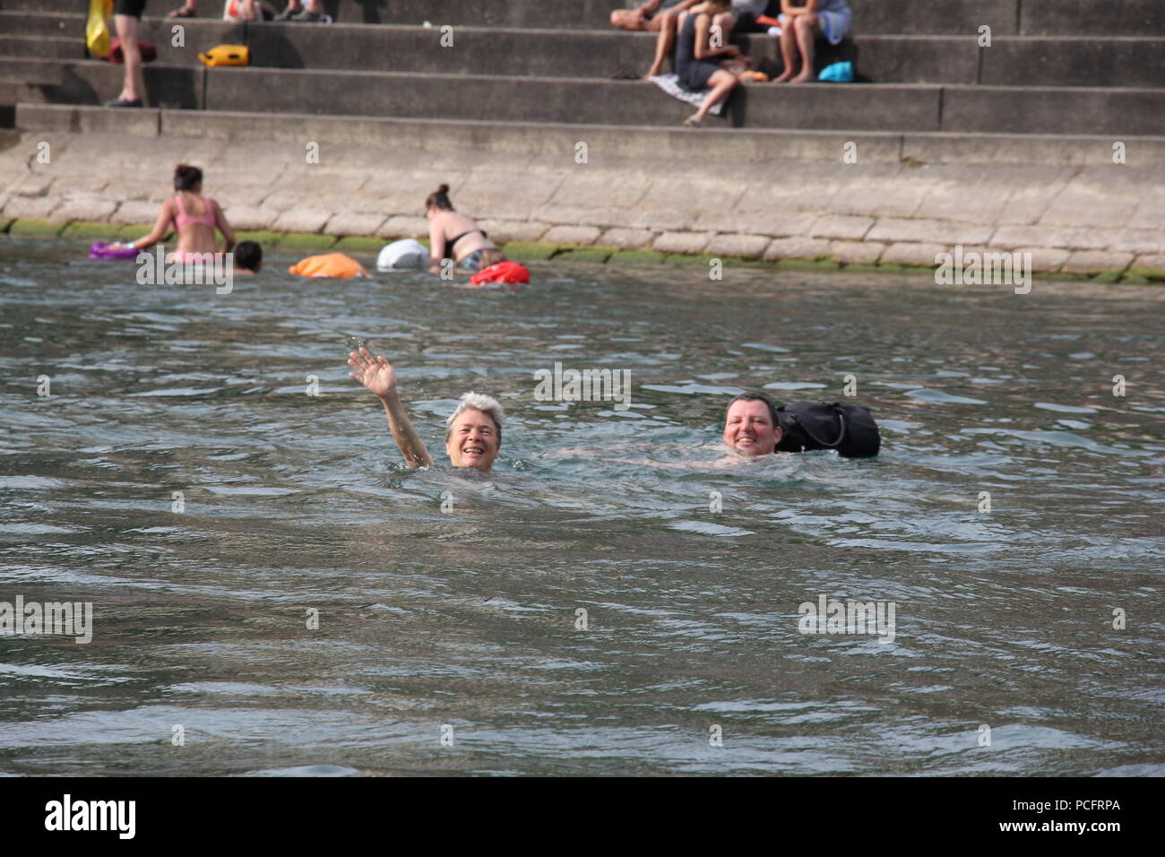 Basel, Switzerland. 1st Aug 2018. People swimming in the Rhine river in ...