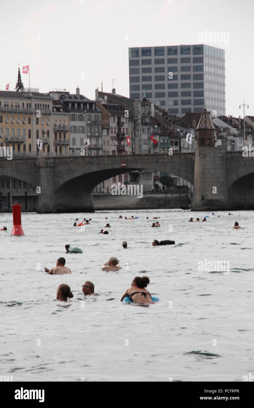 Basel, Switzerland. 1st Aug 2018. People swimming in the Rhine river in ...