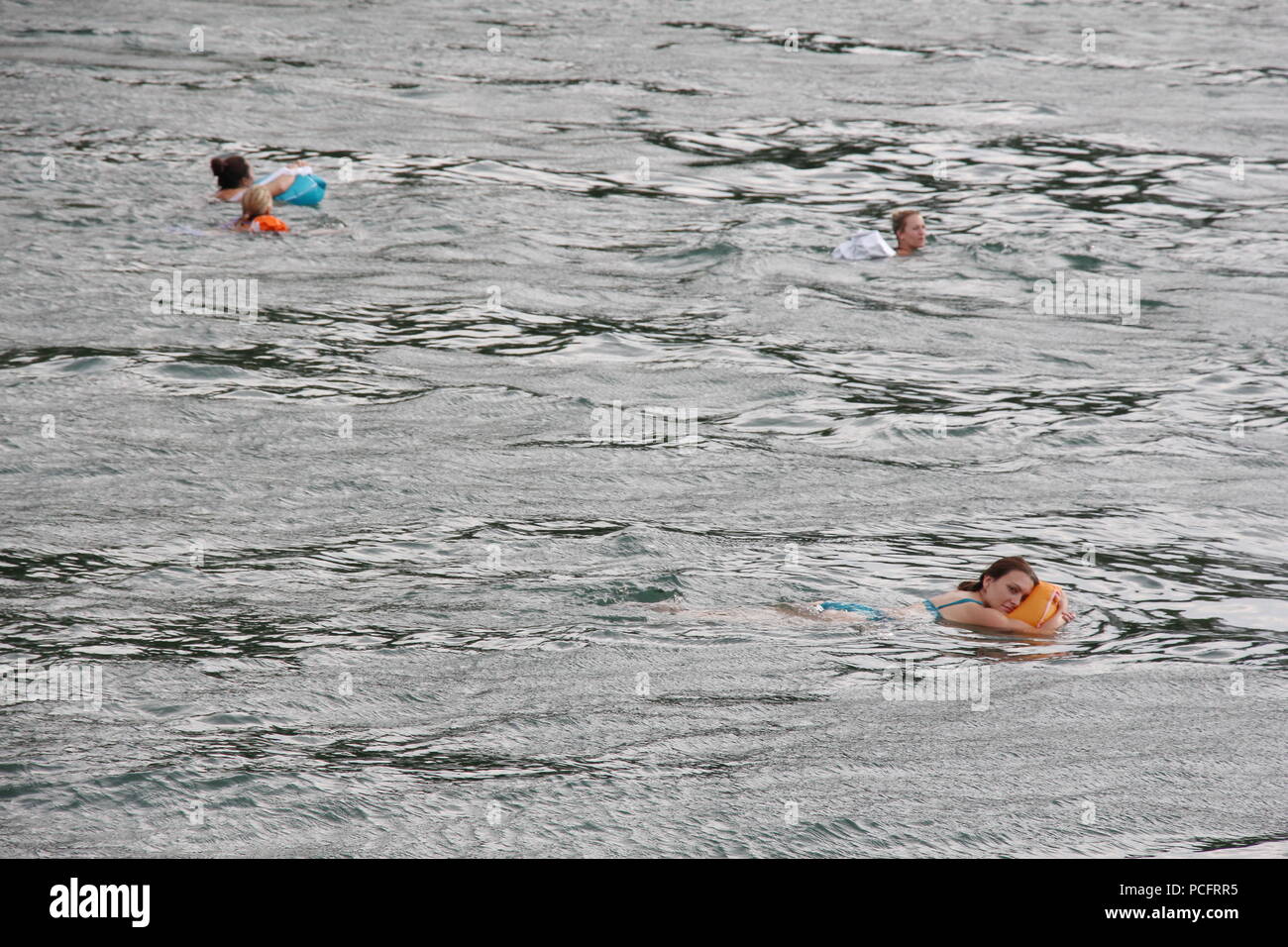 Basel, Switzerland. 1st Aug 2018. People swimming in the Rhine river in ...