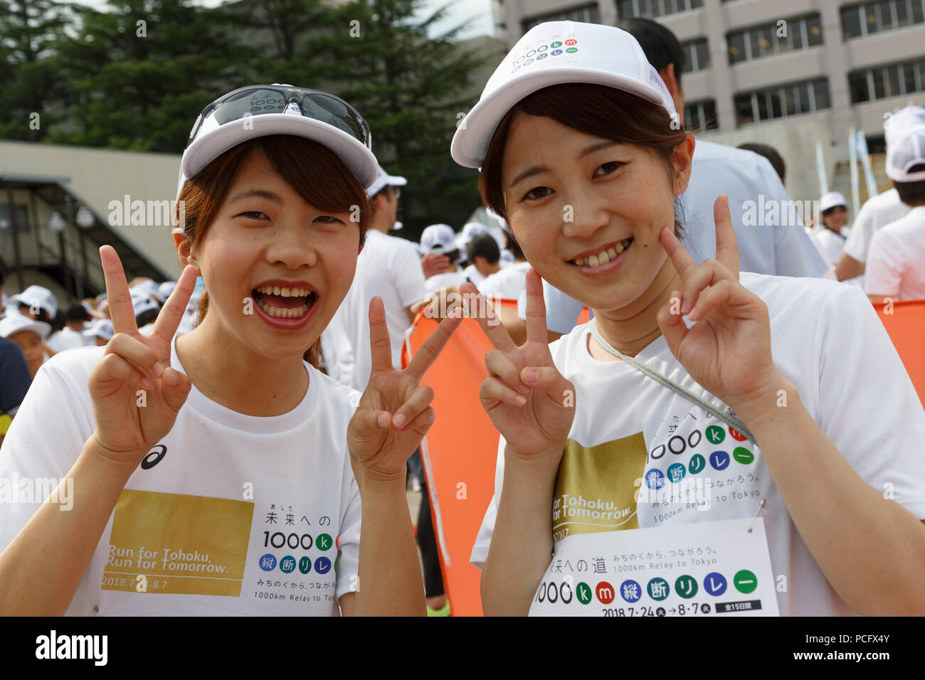 Participants pose for a photograph before the start of their ''1000km ...