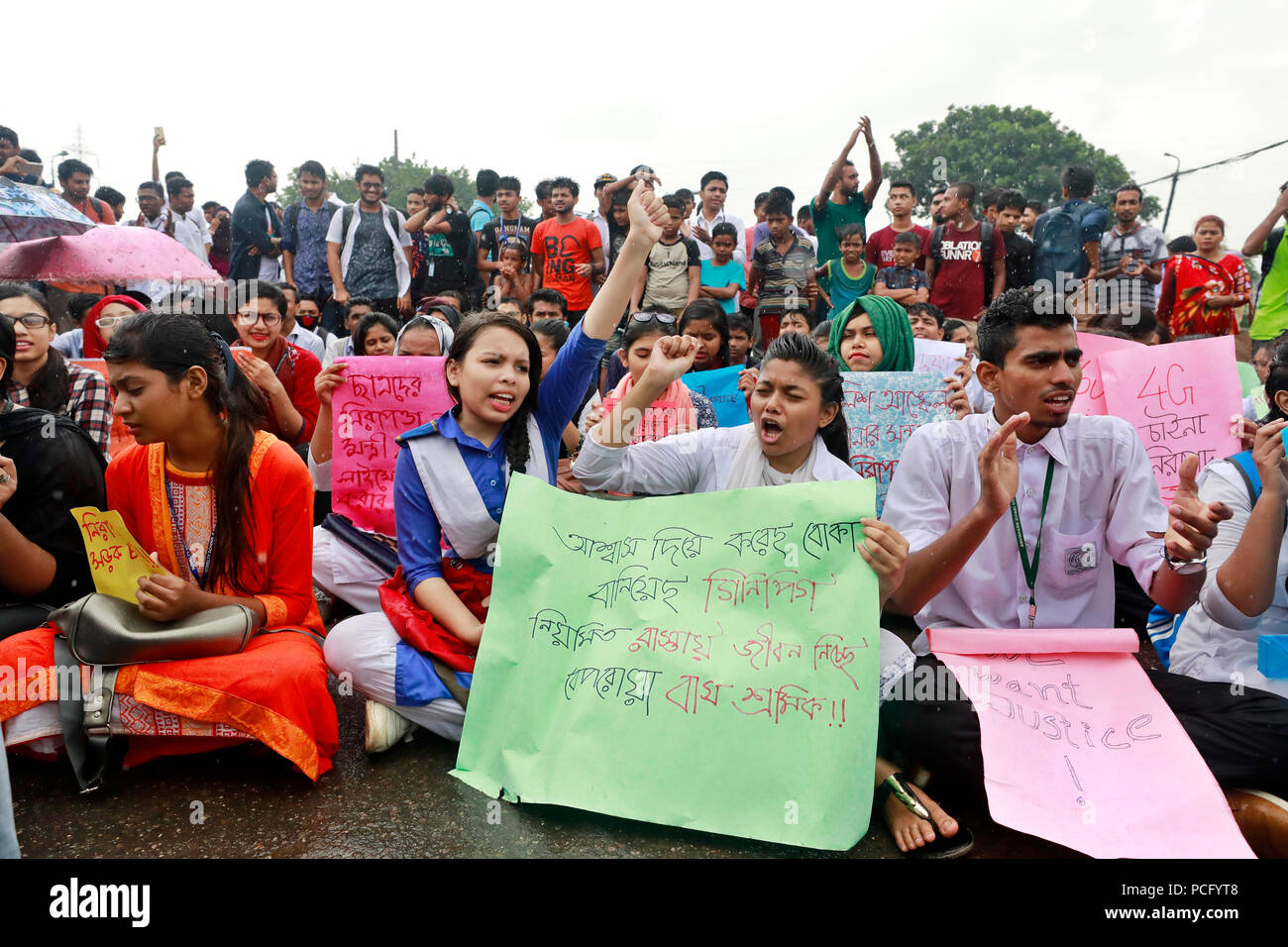 Dhaka, Bangladesh - August 02, 2018: A group of students gather and demonstration block traffic ...