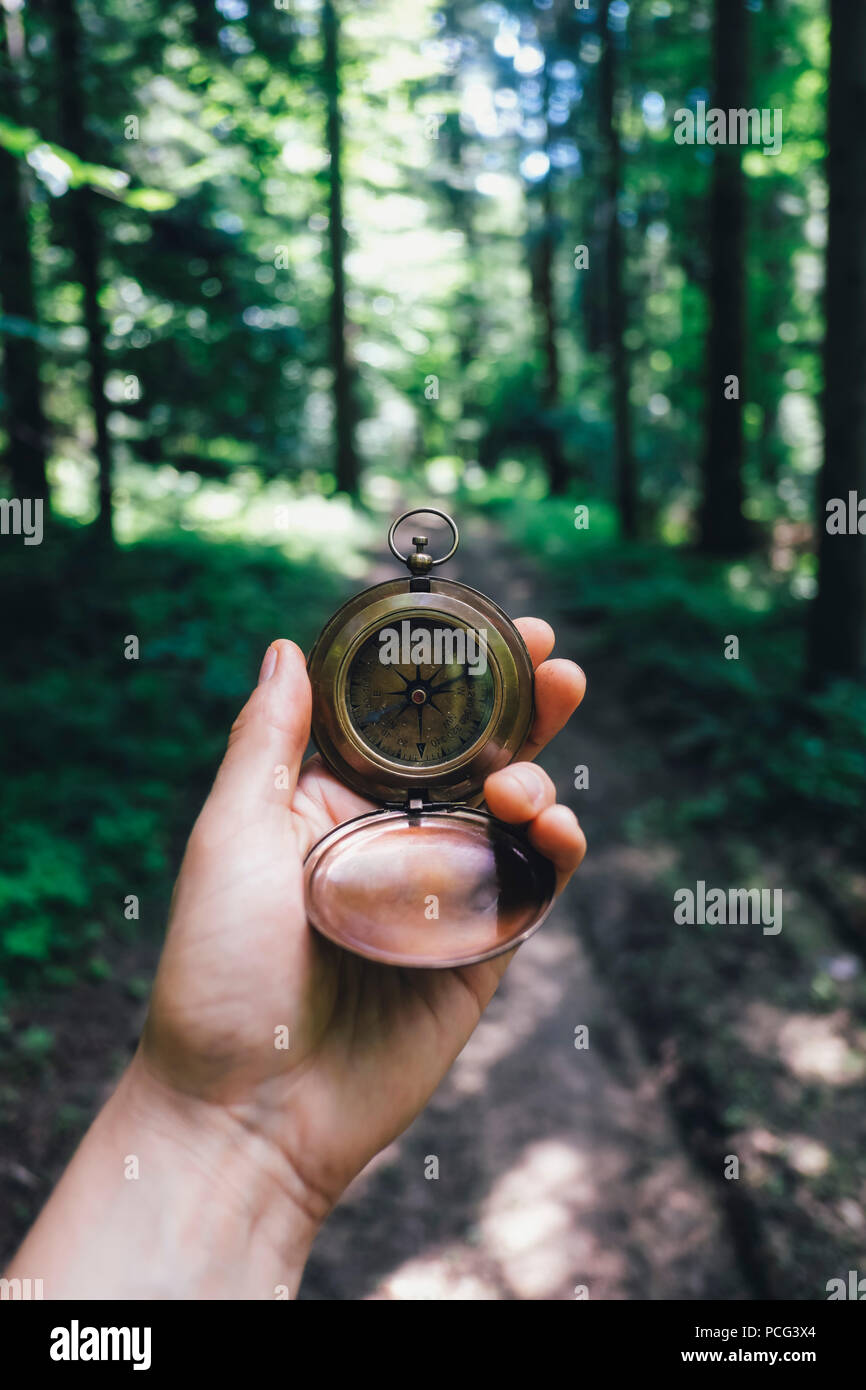 Compass hand hi-res stock photography and images - Alamy