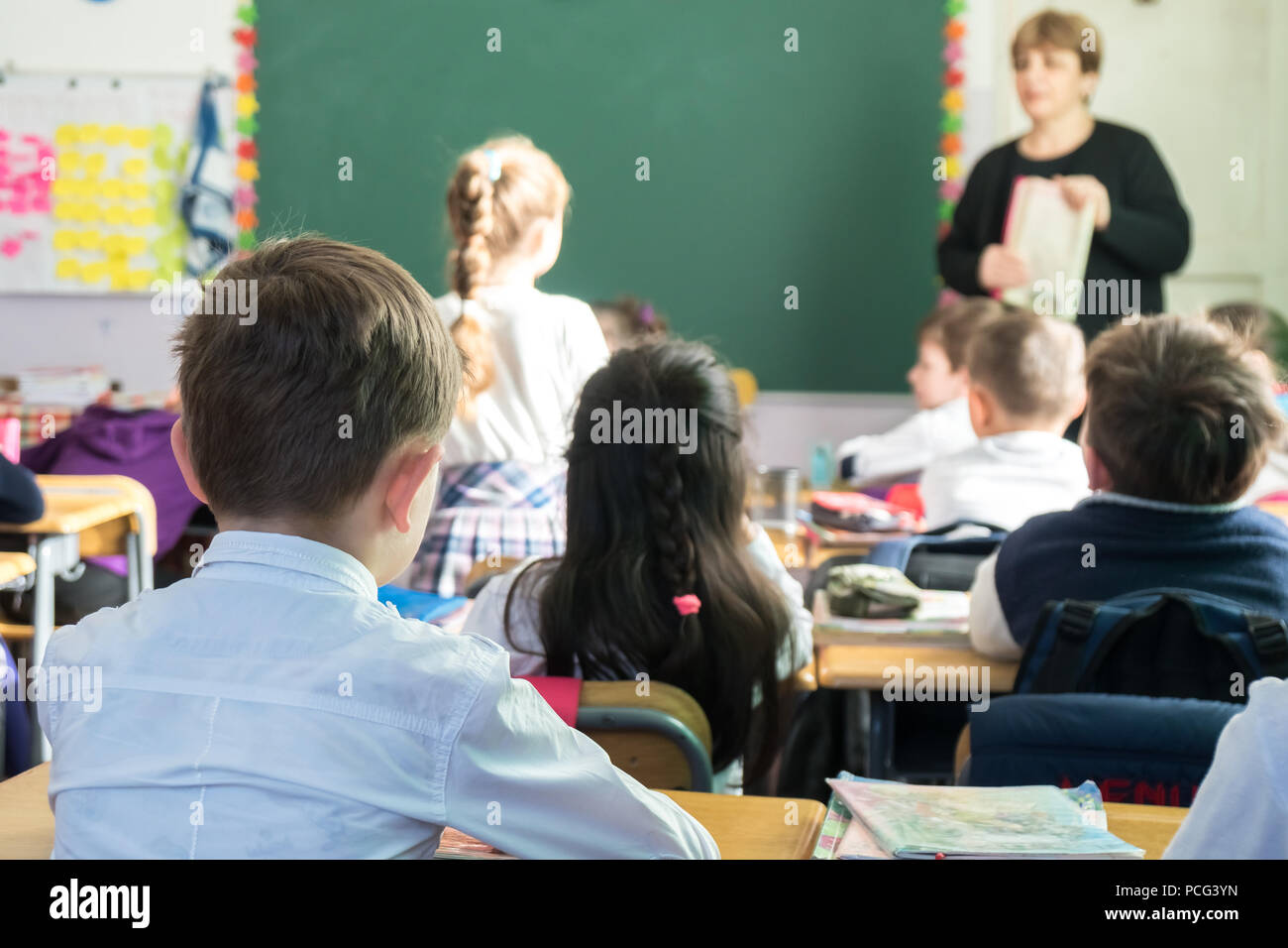 school children are participating actively in class Stock Photo - Alamy