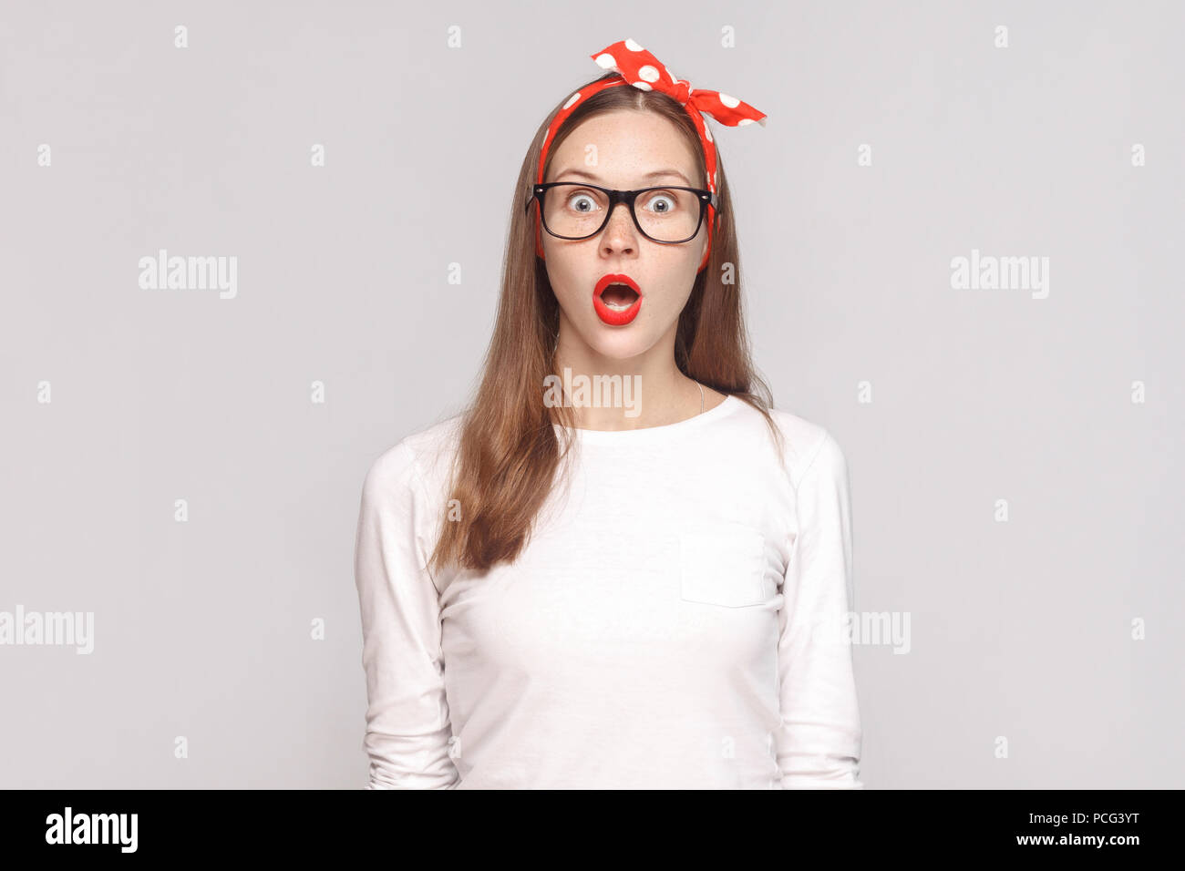 wondered shocked face. portrait of beautiful emotional young woman in ...