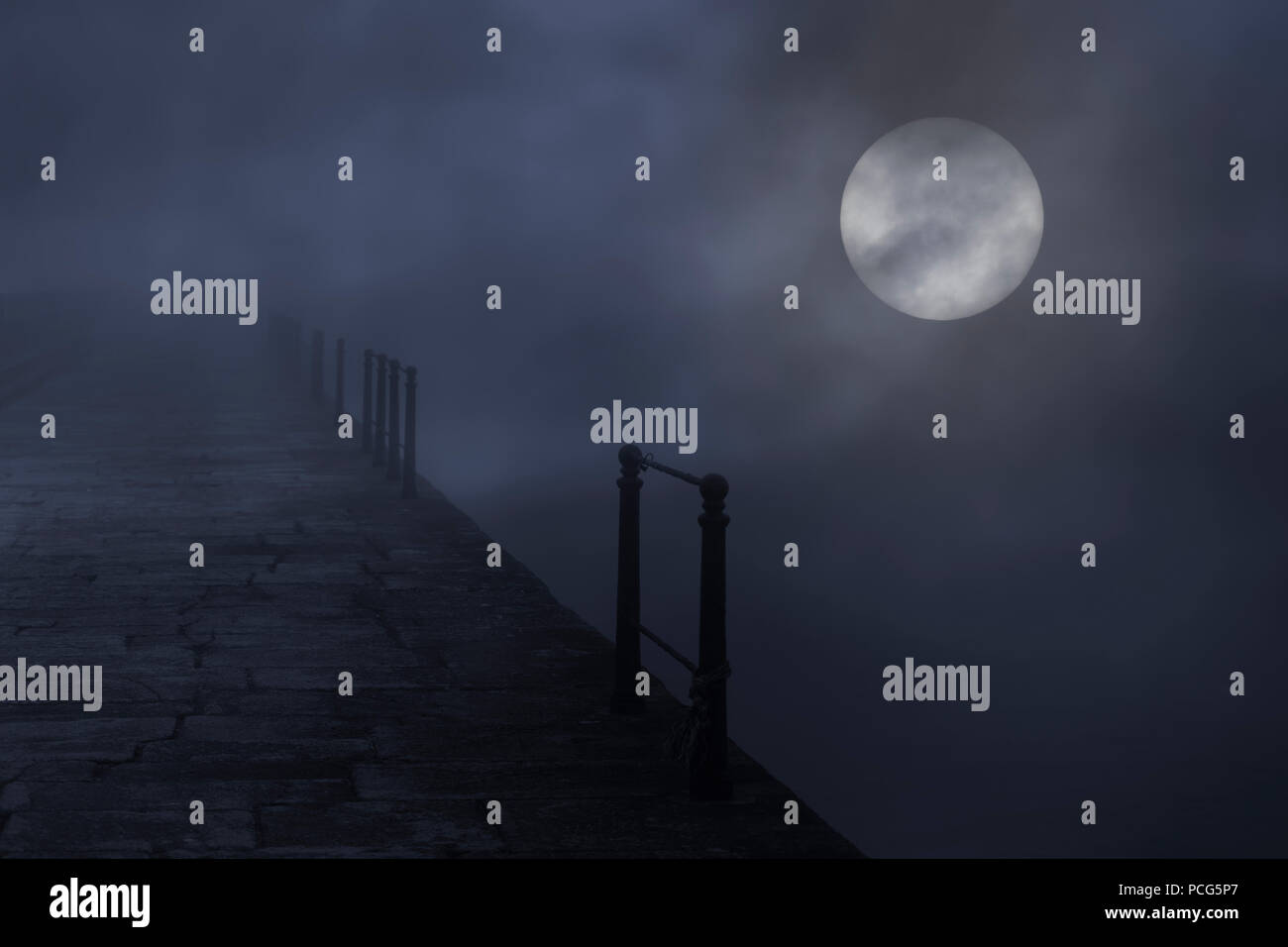 Old river mouth granite pier with dangerous corrupted security railing ...