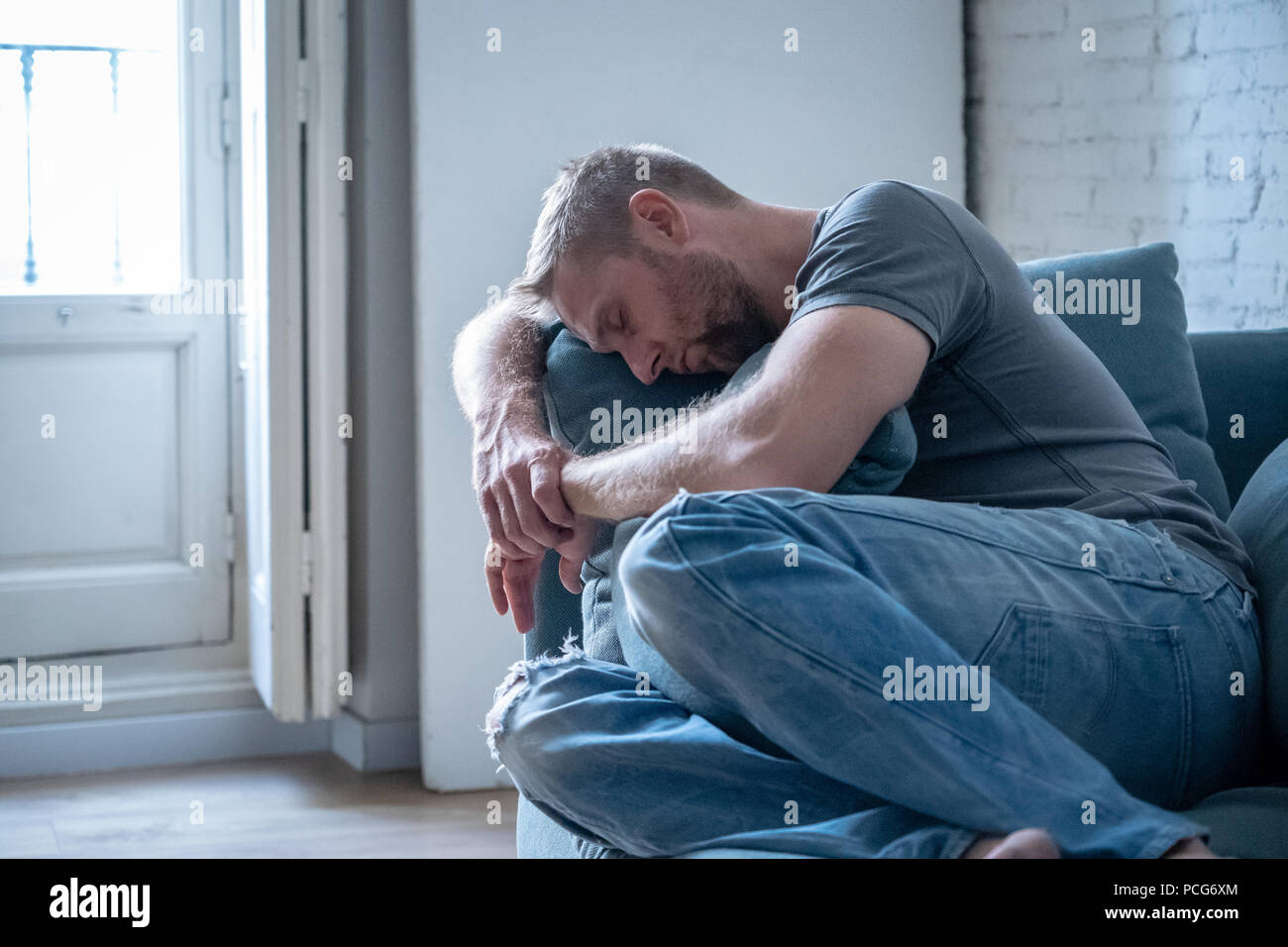 Young white male depressed hi-res stock photography and images - Alamy