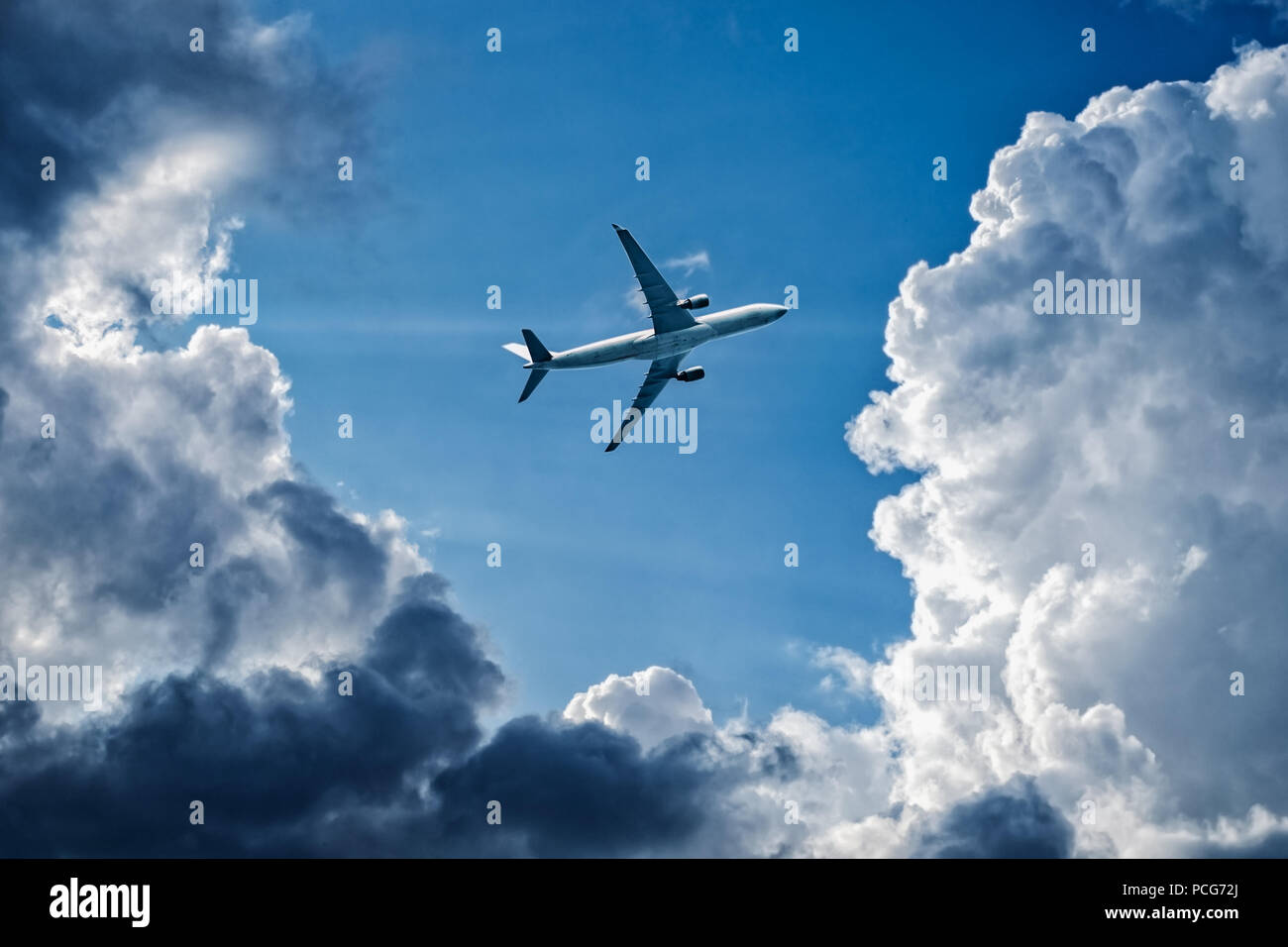 Complex flight conditions - plane flies through storm clouds, rainy ...