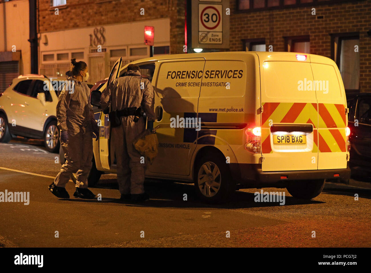 Forensic officers in Warham Street in Camberwell, south London, where a ...