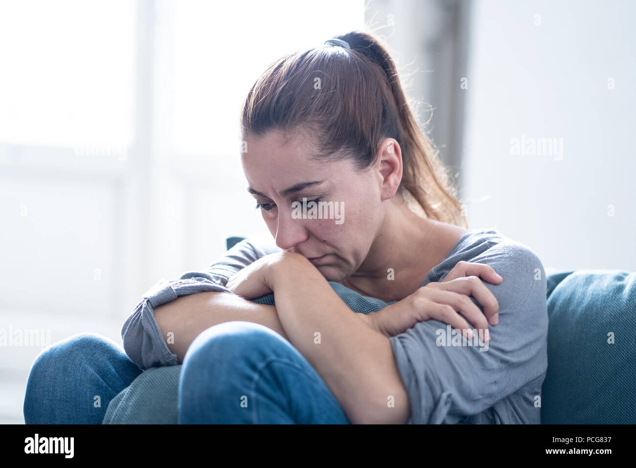 Young woman suffering from depression Stock Photo - Alamy