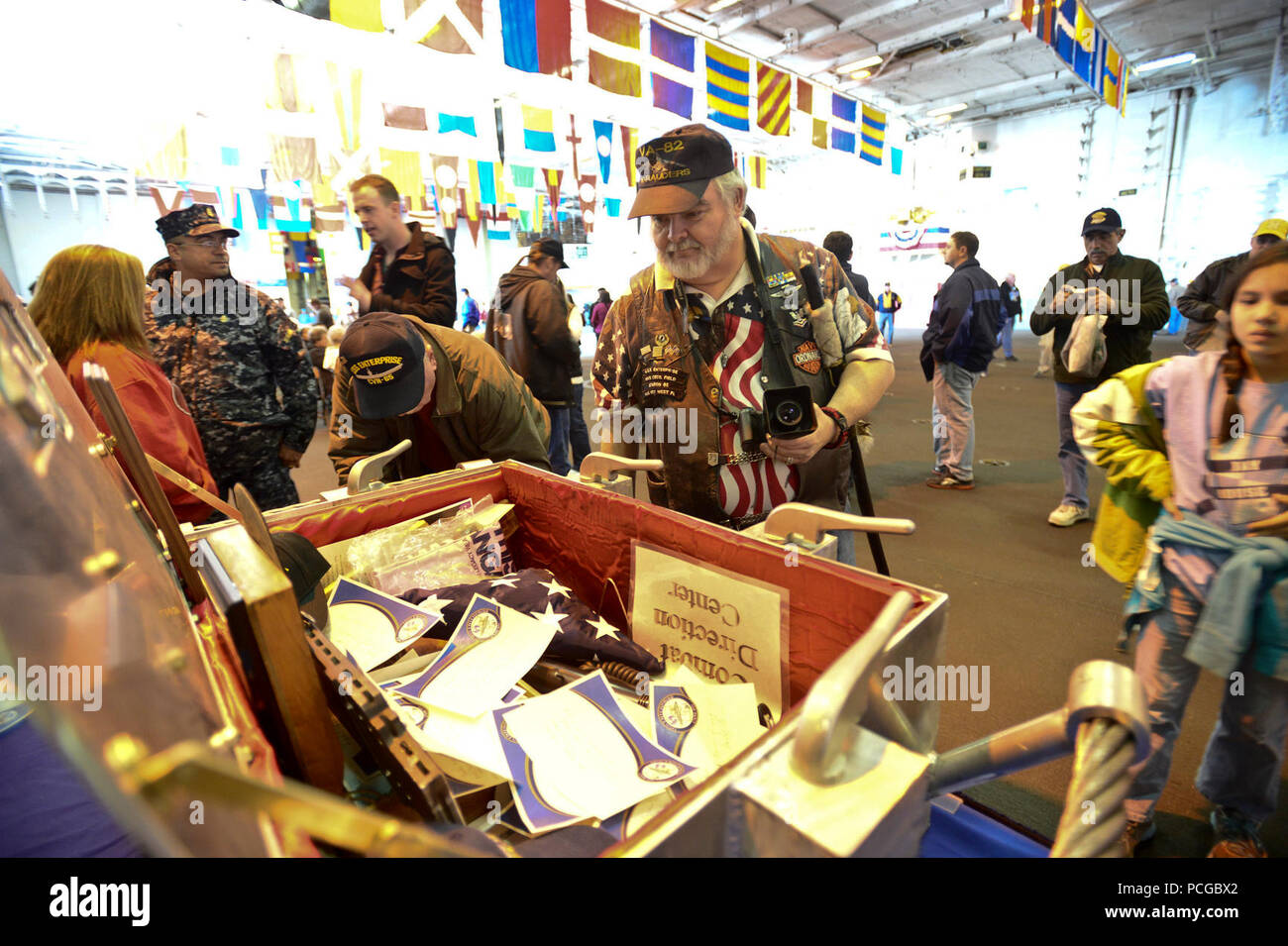 NORFOLK (Nov. 30, 2012) A veteran looks into the aircraft carrier USS ...