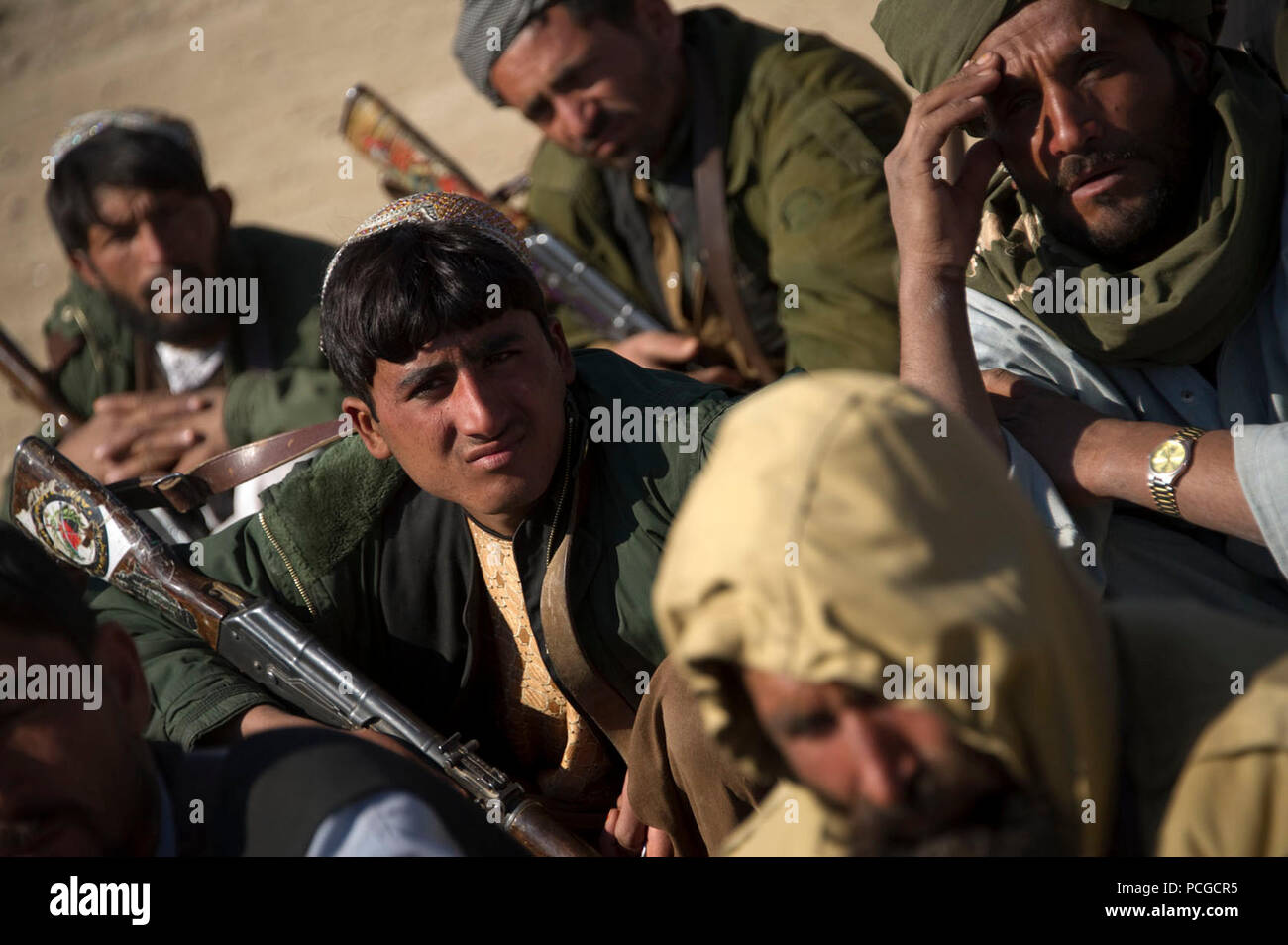Afghan Local Police candidates listen to instructions from an Afghan ...