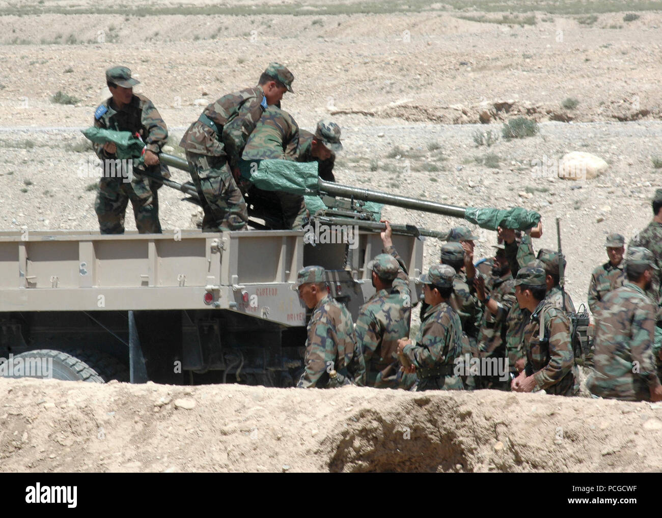 (Kabul, Afghanistan) Afghan National Army trainees load two Russain ...