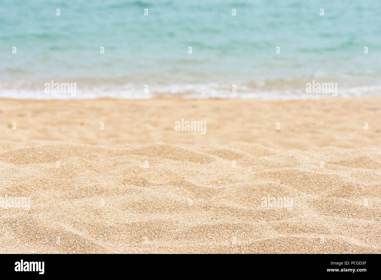 Sea sand and blue sea. Sea sand background Stock Photo - Alamy