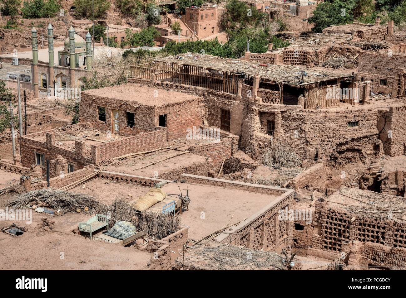 Tuyuk is an ancient oasis-village in the Taklamakan desert in cutting ...