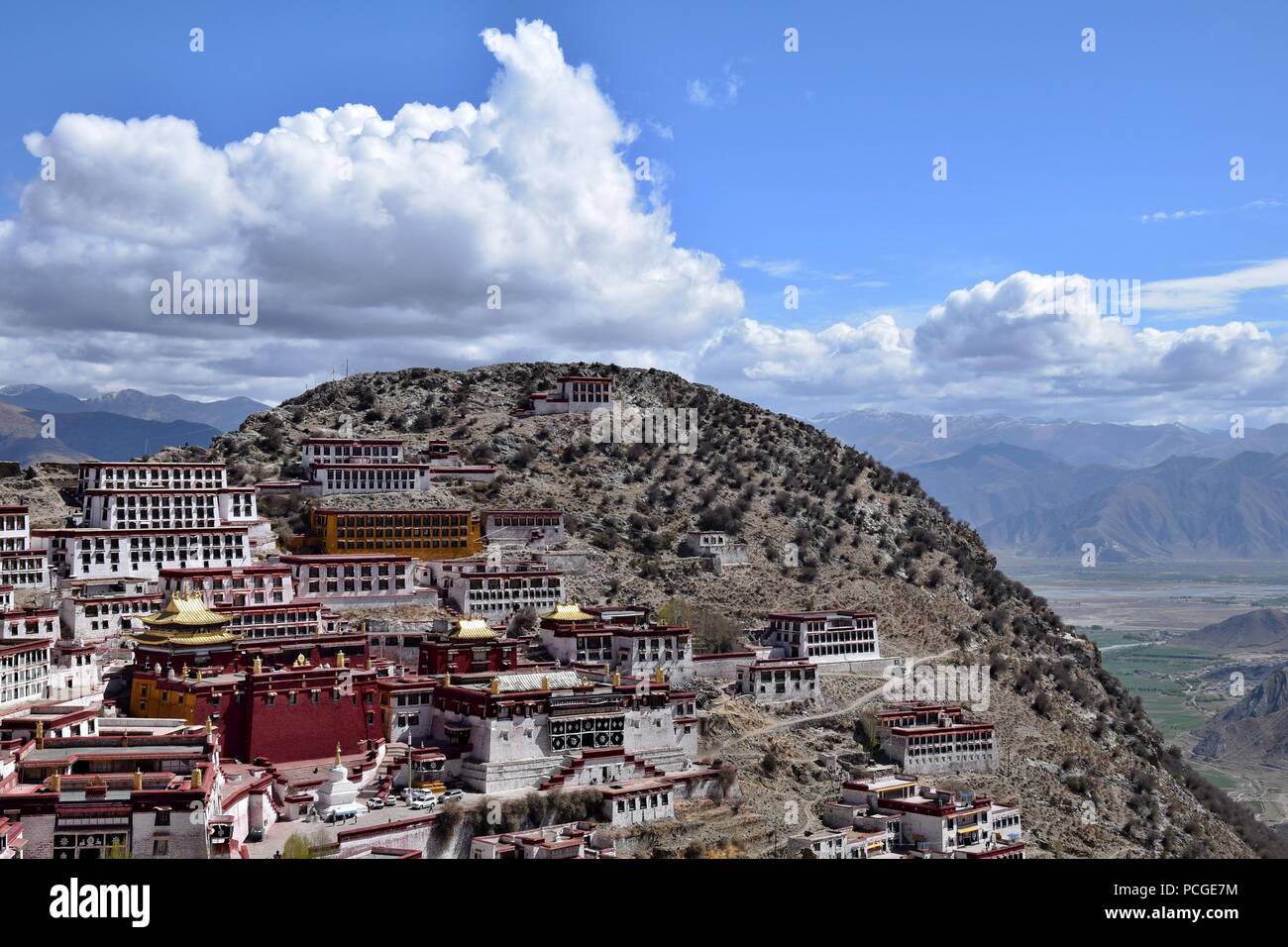 Ganden Monastery located at the top of Wangbur Mountain is one of the ...
