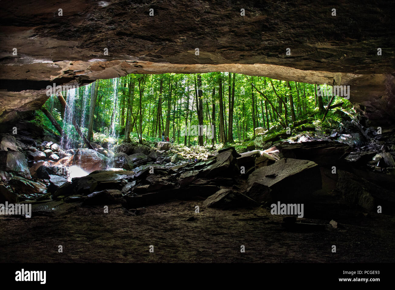 In the mouth of the cave Stock Photo - Alamy