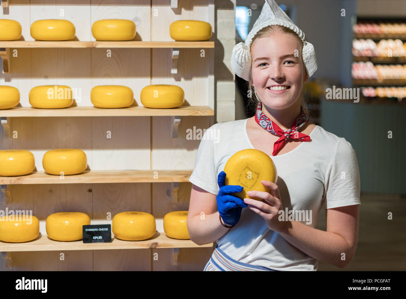 Dutch costume woman cheese hi-res stock photography and images - Alamy