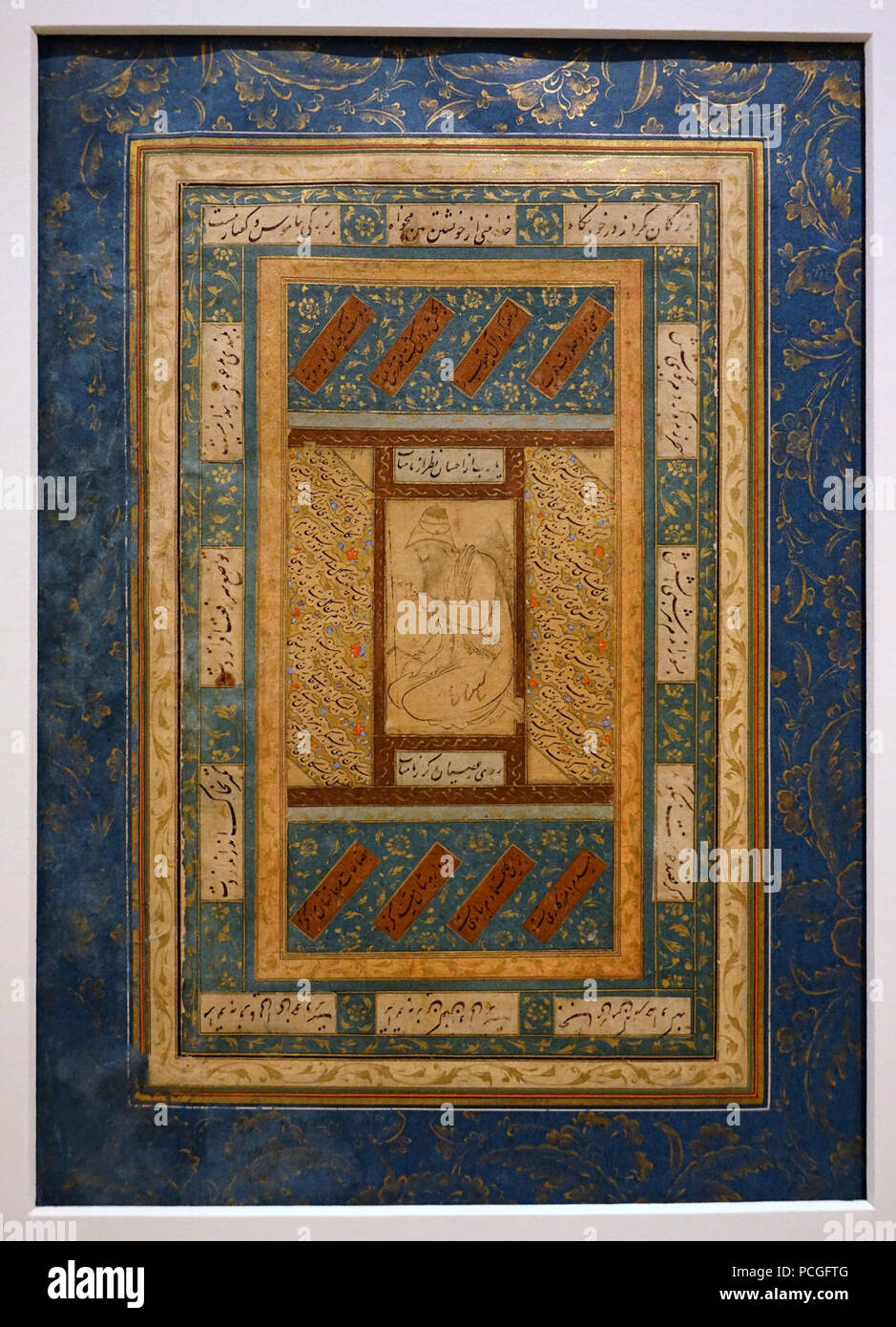 Album leaf (muraqqa') of nasta'liq calligraphy with drawing of seated ...