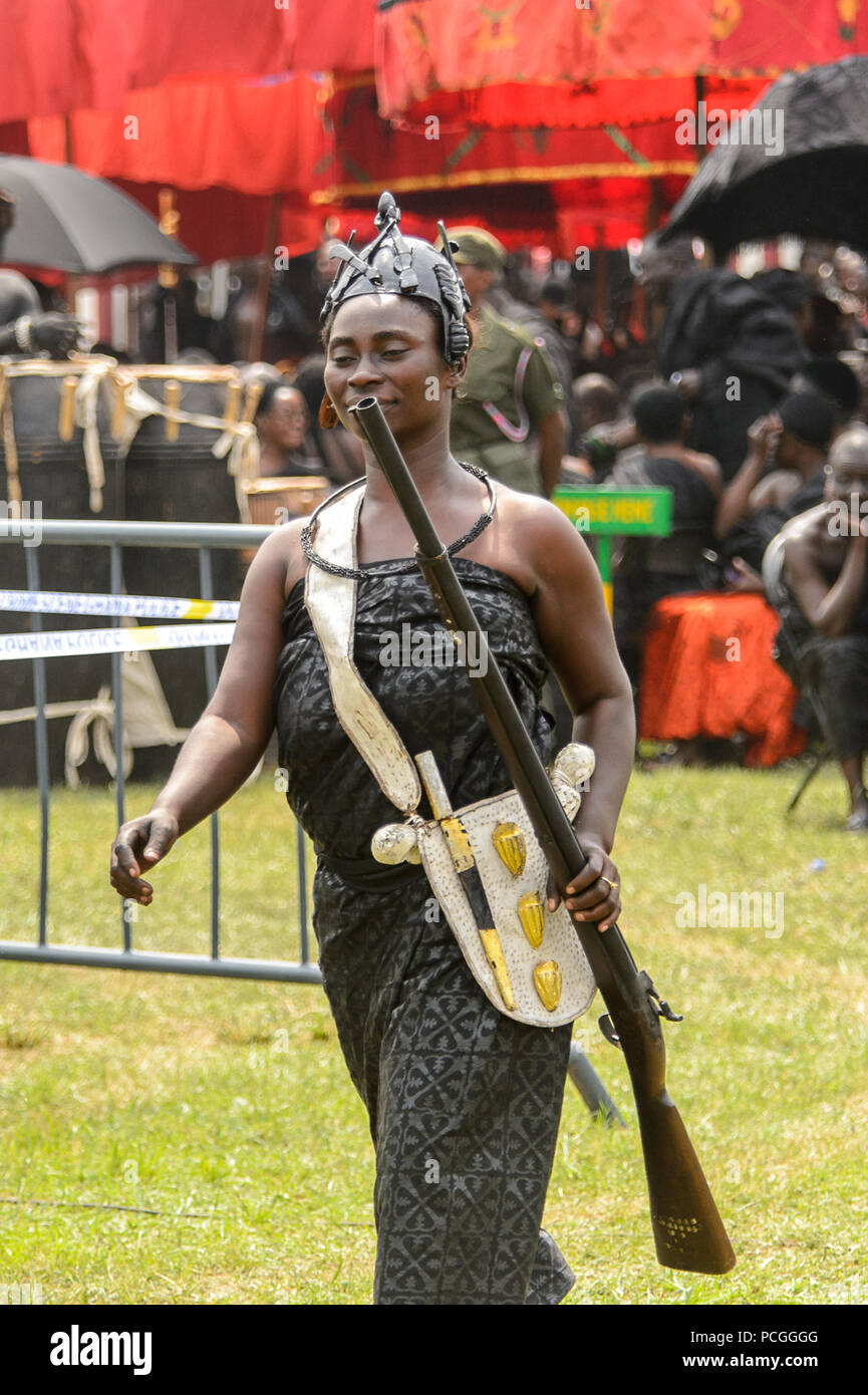 KUMASI, GHANA - JAN 16, 2017: Unidentified Ghanaian woman with a gun in ...