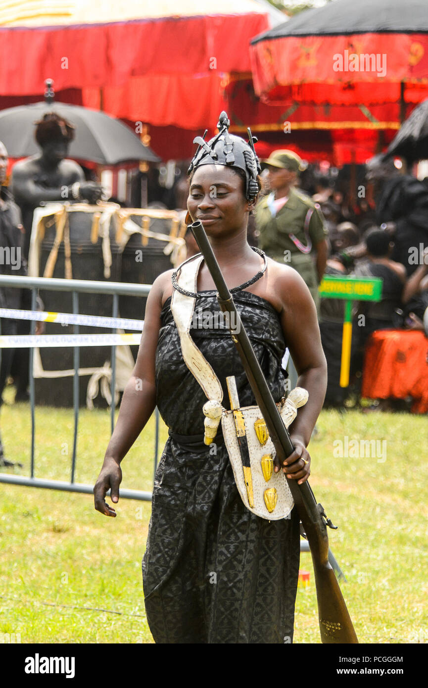 KUMASI, GHANA - JAN 16, 2017: Unidentified Ghanaian woman with a gun in ...