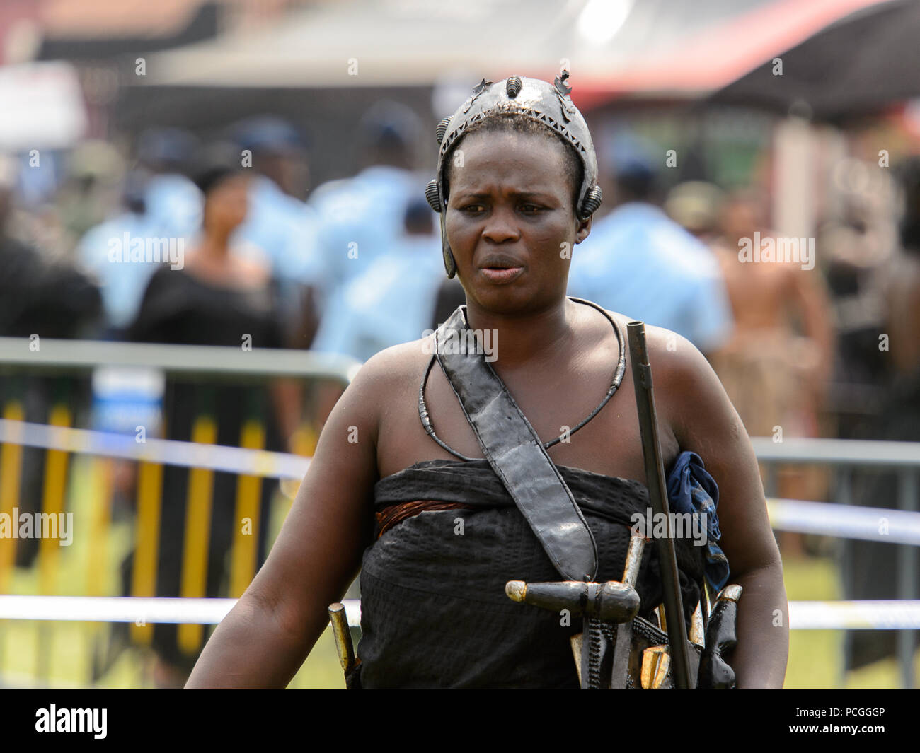 KUMASI, GHANA - JAN 16, 2017: Unidentified Ghanaian woman with a gun in ...