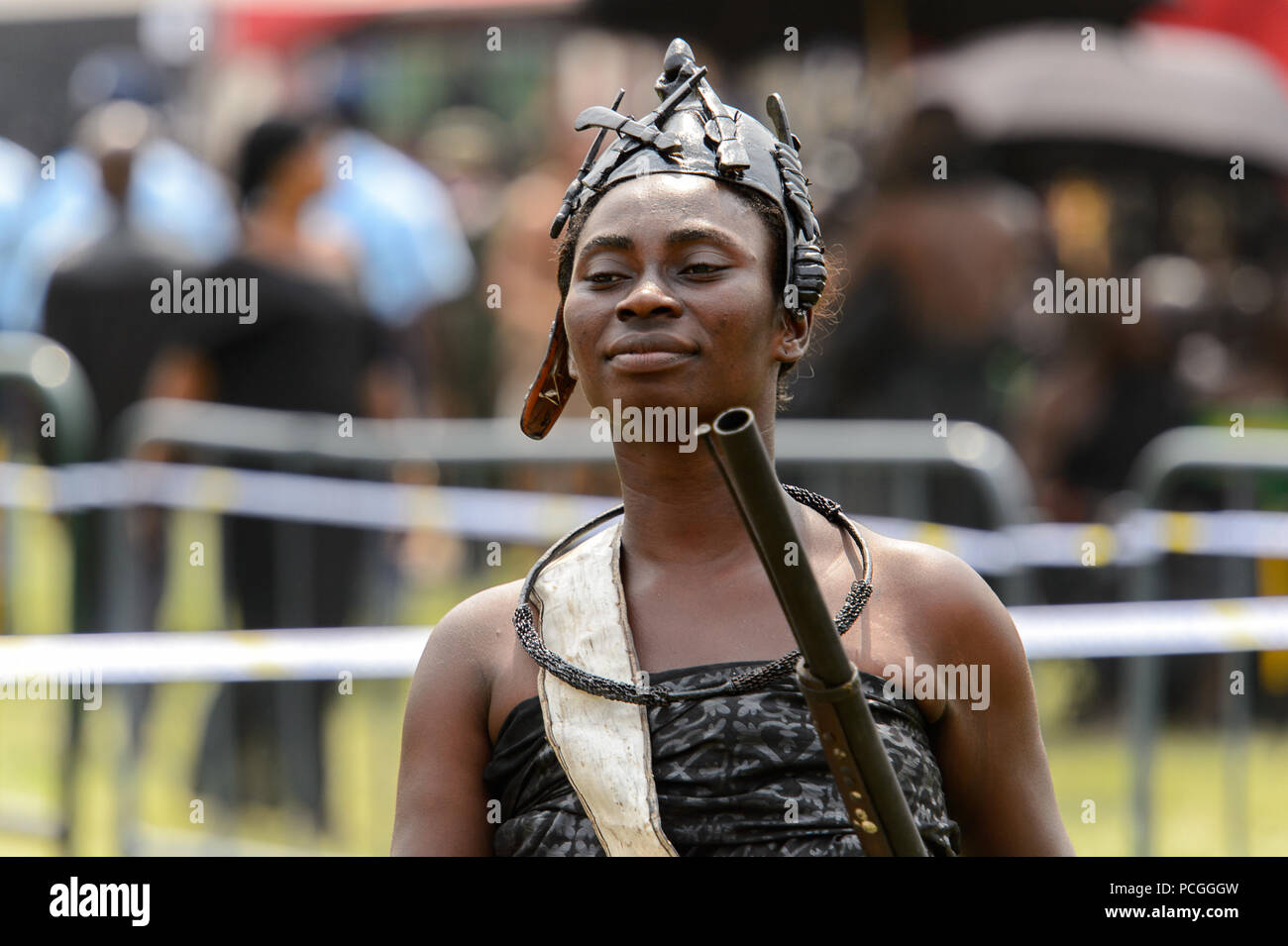 KUMASI, GHANA - JAN 16, 2017: Unidentified Ghanaian woman with a gun in ...