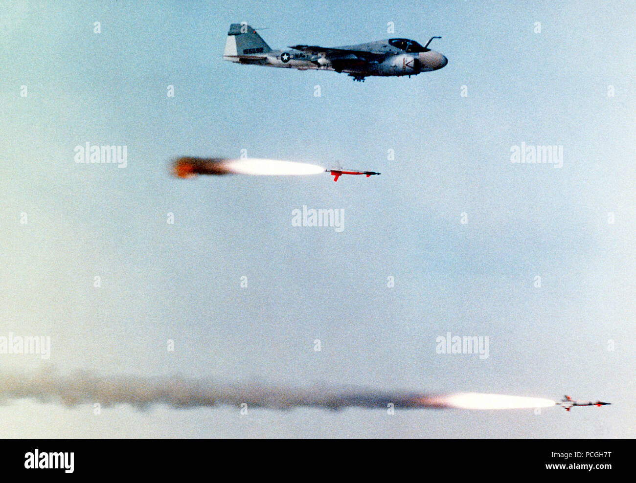 An air-to-air right side view of an A-6 Intruder aircraft as its crew ...
