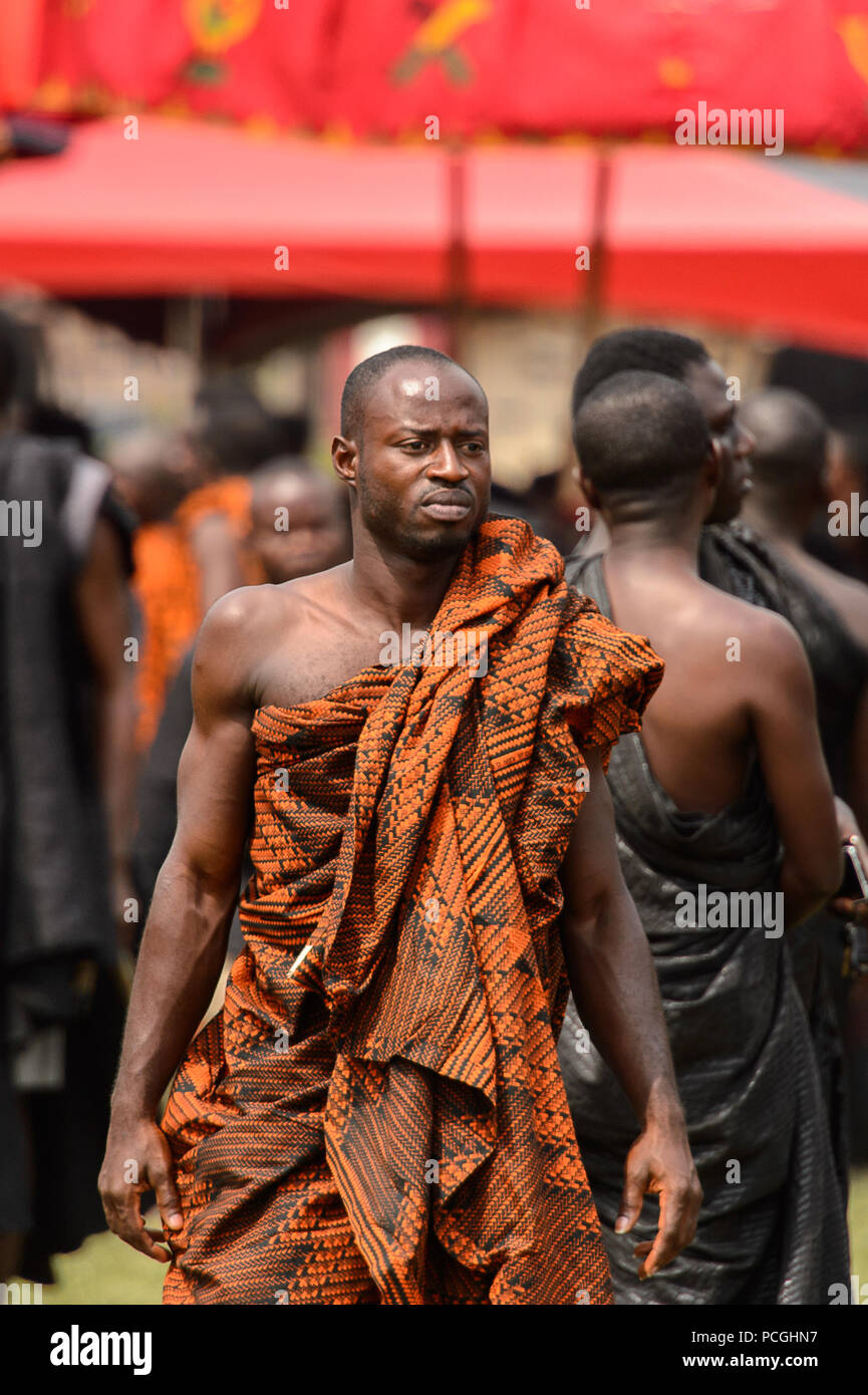KUMASI, GHANA - JAN 16, 2017: Unidentified Ghanaian man in orange ...