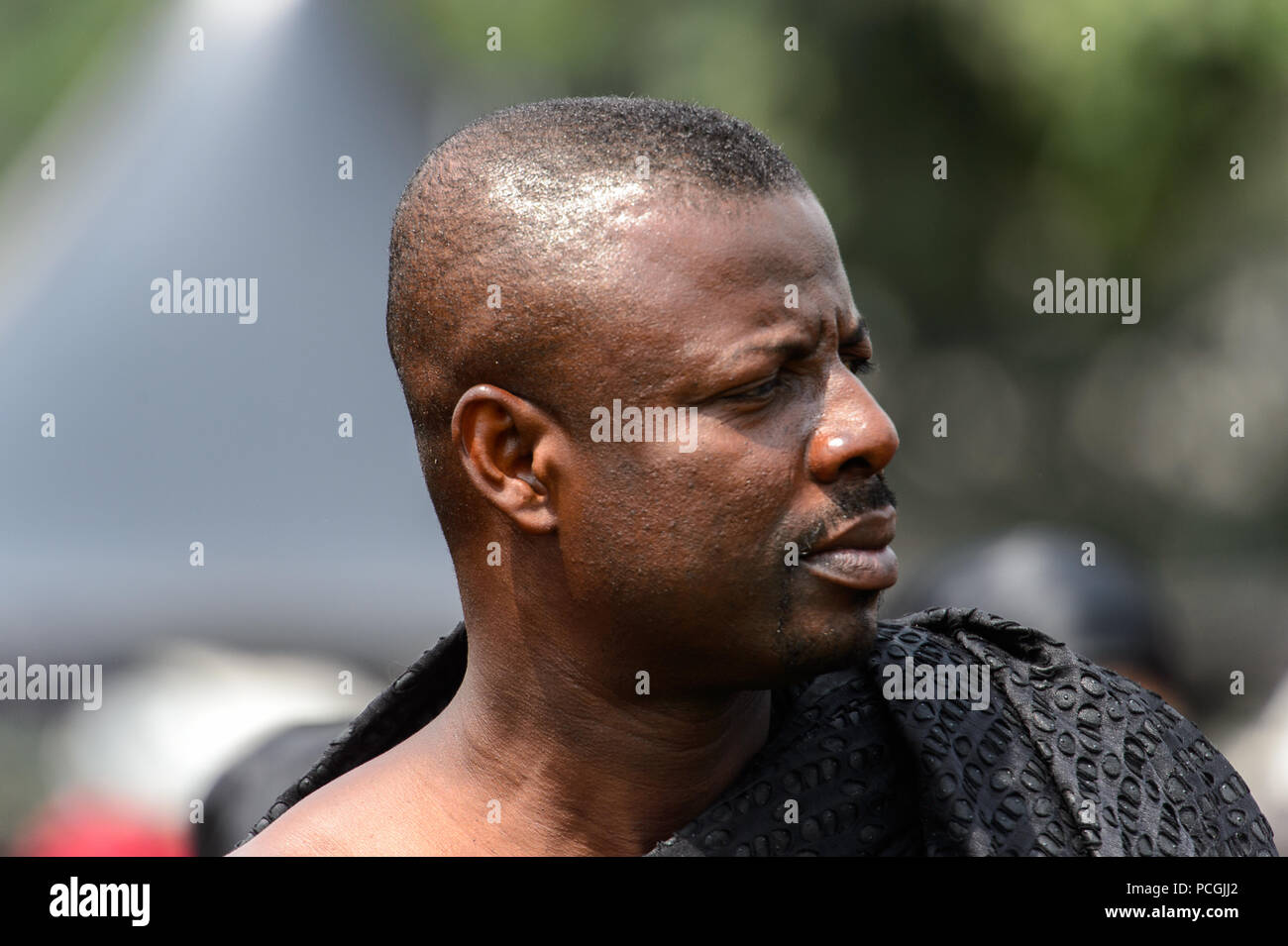 KUMASI, GHANA - JAN 16, 2017: Unidentified Ghanaian man in black ...