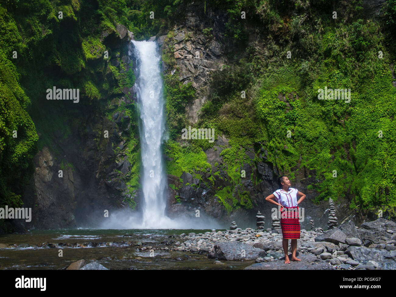 Girl from Ifugao Minority near a waterfall in Batad the Philippines ...