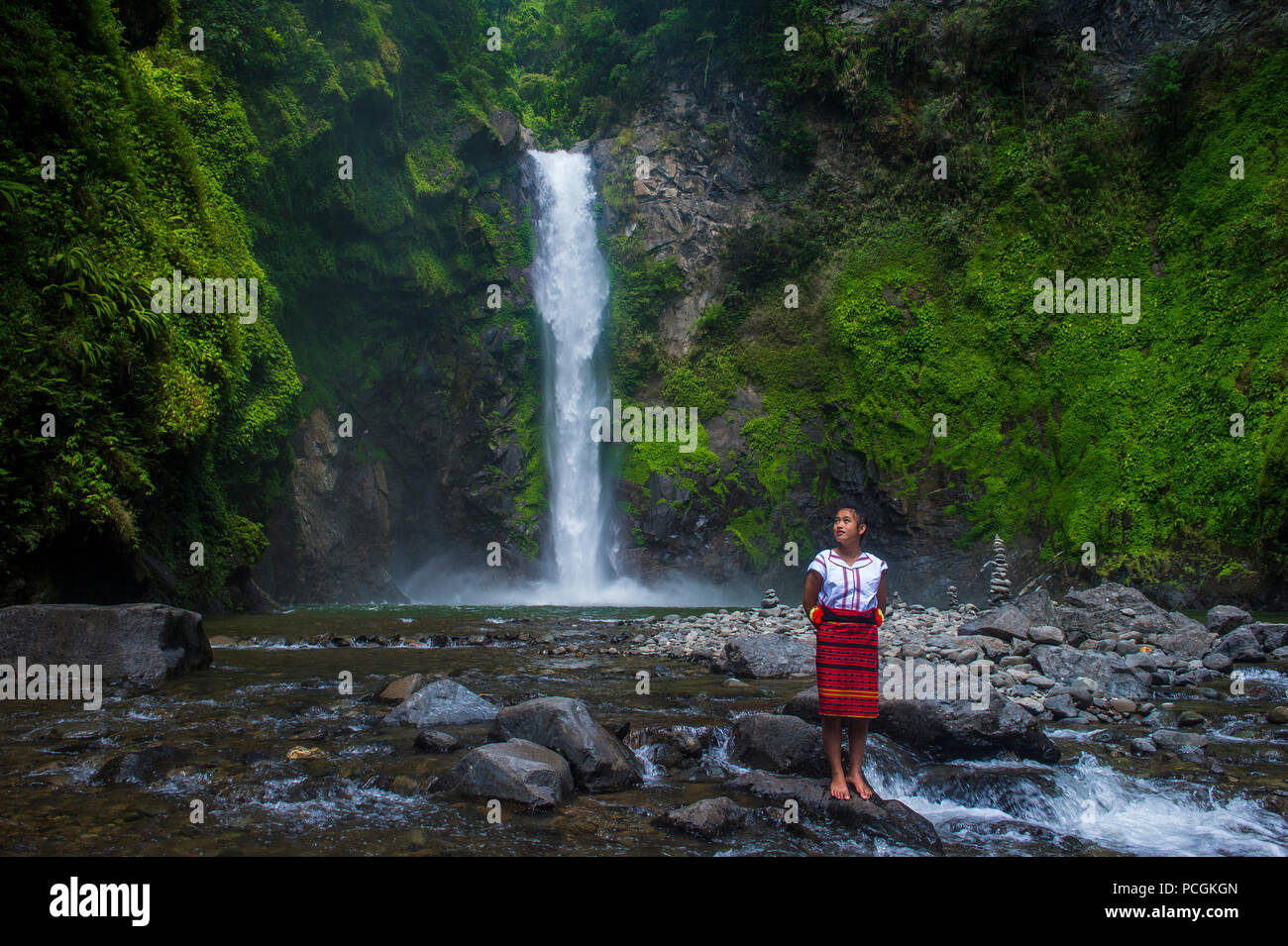 Girl from Ifugao Minority near a waterfall in Batad the Philippines ...