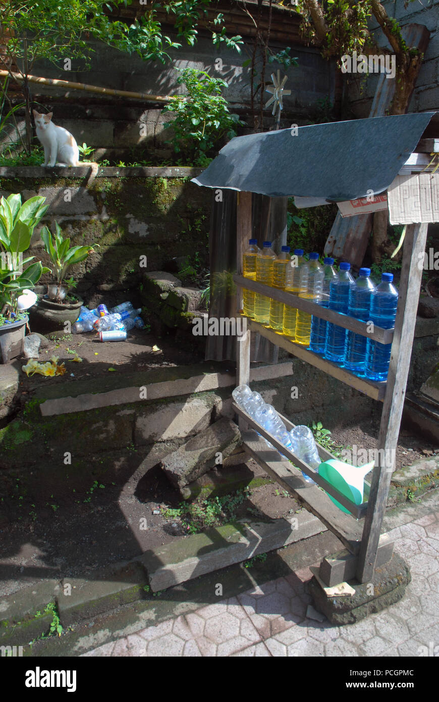 Gasoline petrol sold in bottles at a small local petrol station, Ubud ...