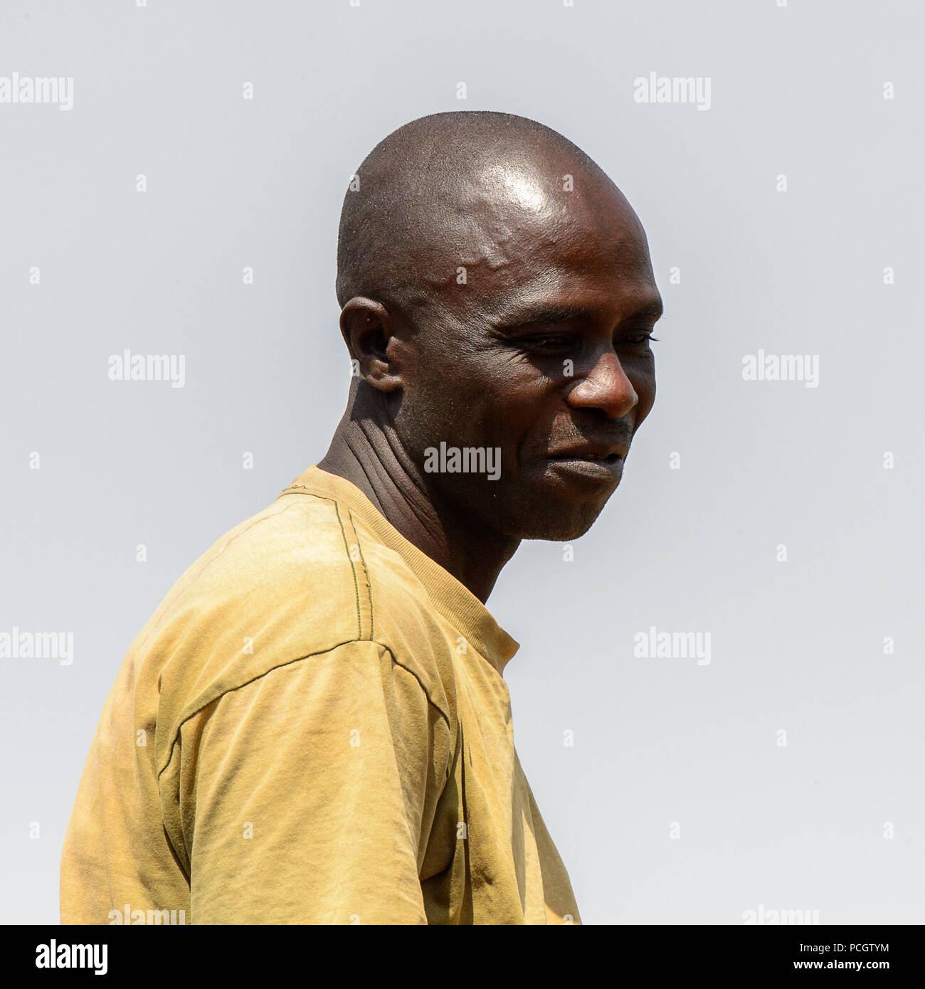 TAMBERMA VIL, TOGO - JAN 13, 2017: Unidentified Tammari man in yellow t ...