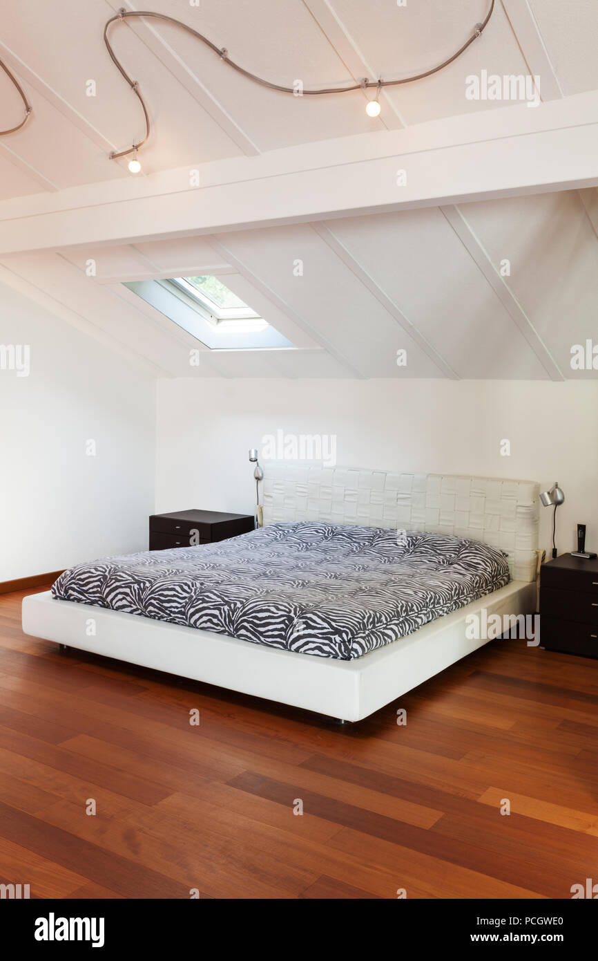 interior loft, nice bedroom, double bed Stock Photo - Alamy