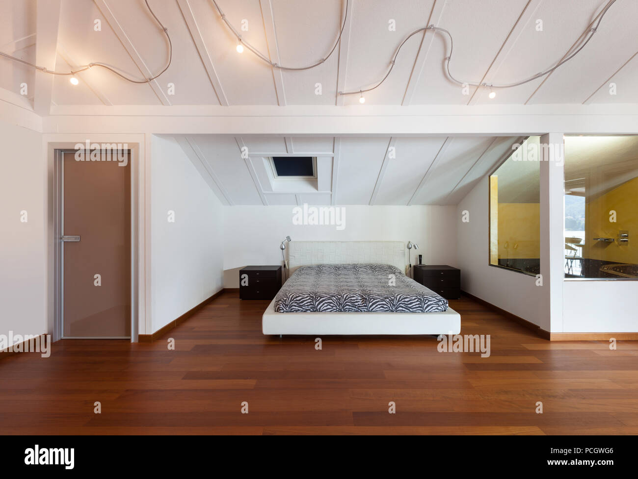 interior loft, nice bedroom, double bed Stock Photo - Alamy