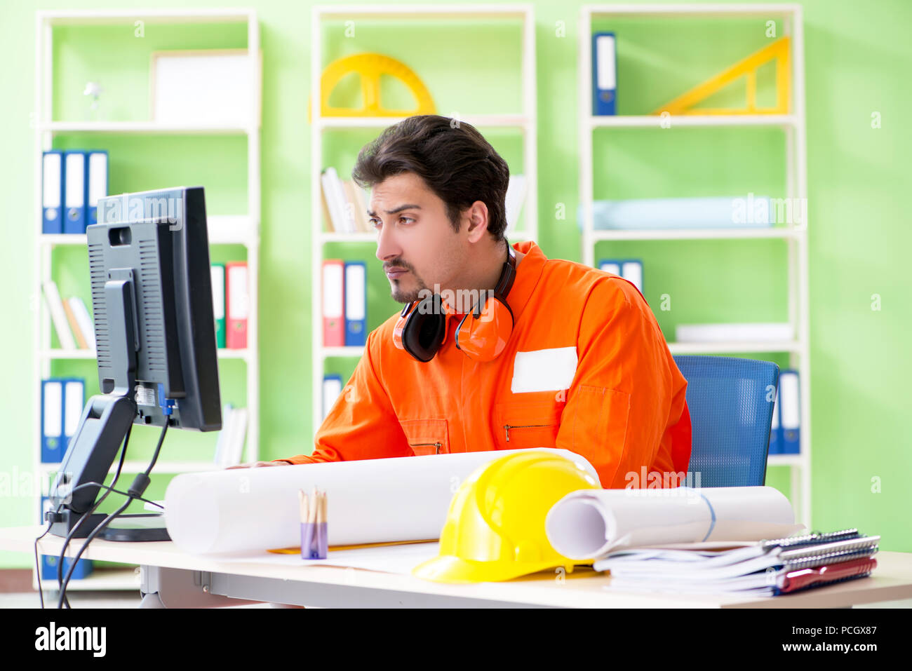 Construction supervisor planning new project in office Stock Photo - Alamy