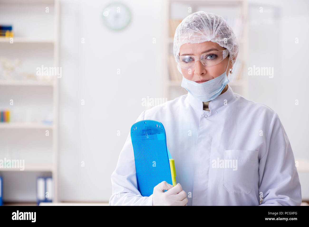 Woman doctor working in hospital clinic lab Stock Photo - Alamy